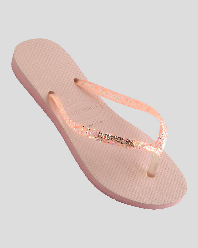 Shop Havaianas Slim Glitter Flourish Thongs In Macaron Pink - Fast ...