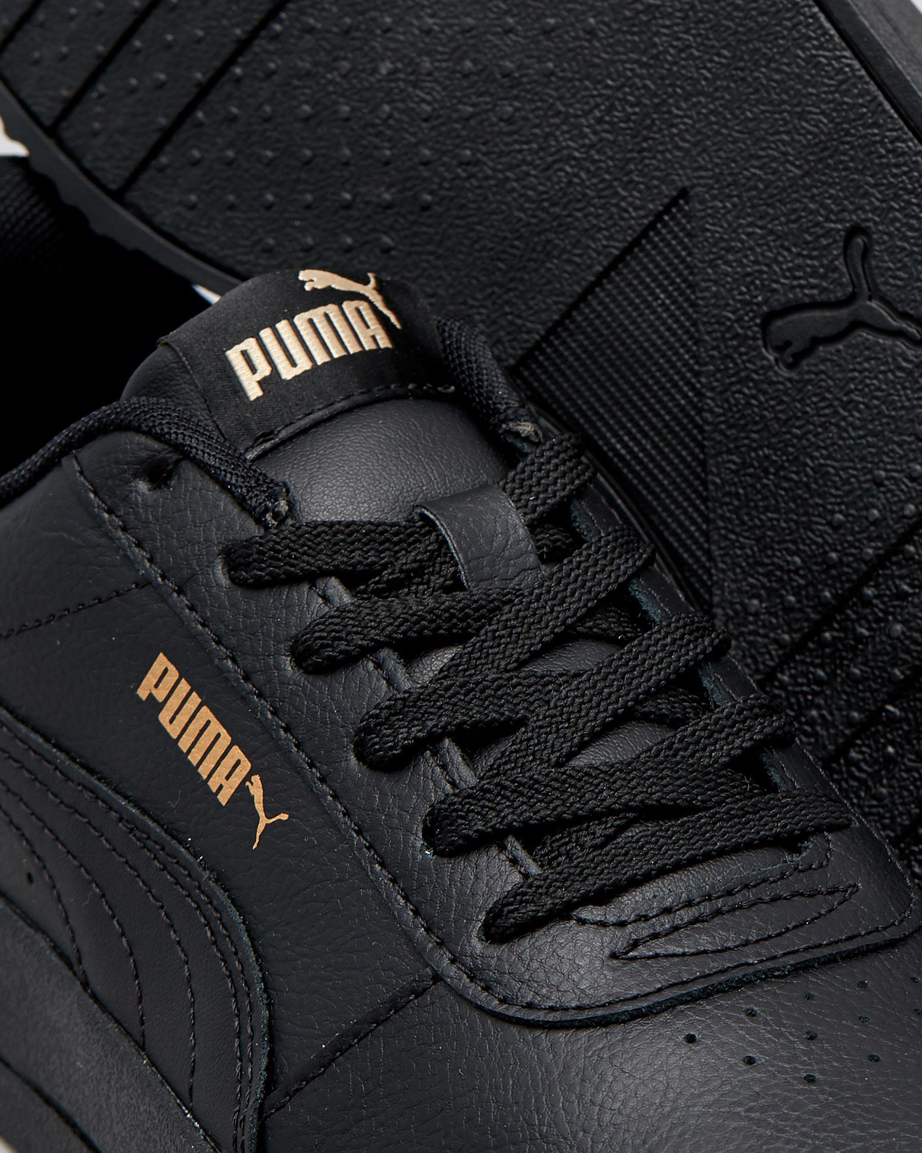 Shop Puma Womens Carina Lift Shoes In Black/black/gold - Fast Shipping ...