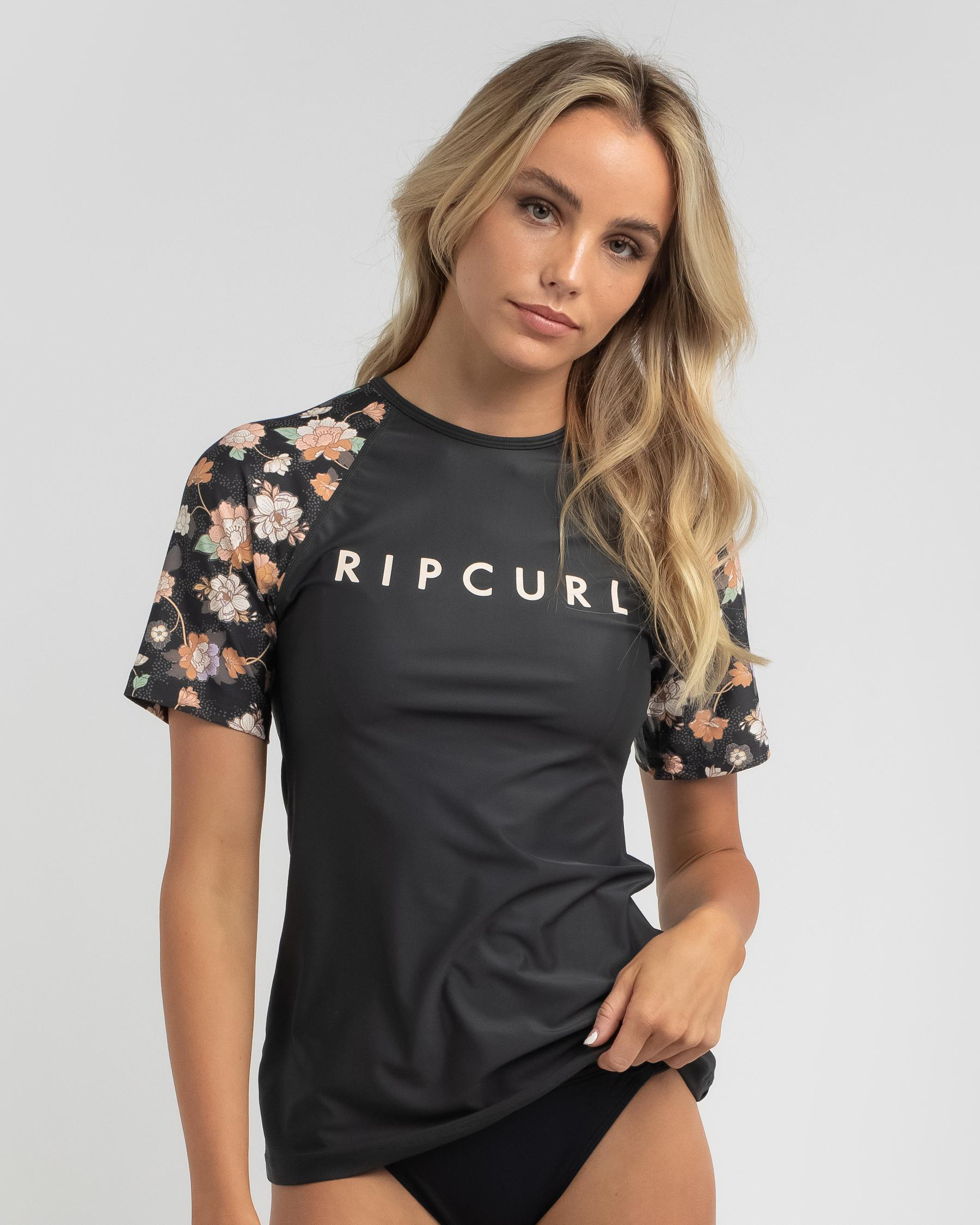 Shop Rip Curl Sunset Waves Short Sleeve Rash Vest In Washed Black ...