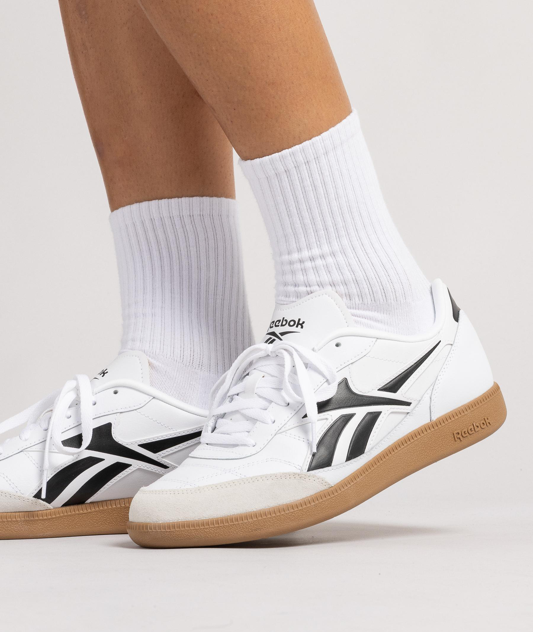 Shop Reebok Finale Shoes In White/black/barely Grey - Fast Shipping ...