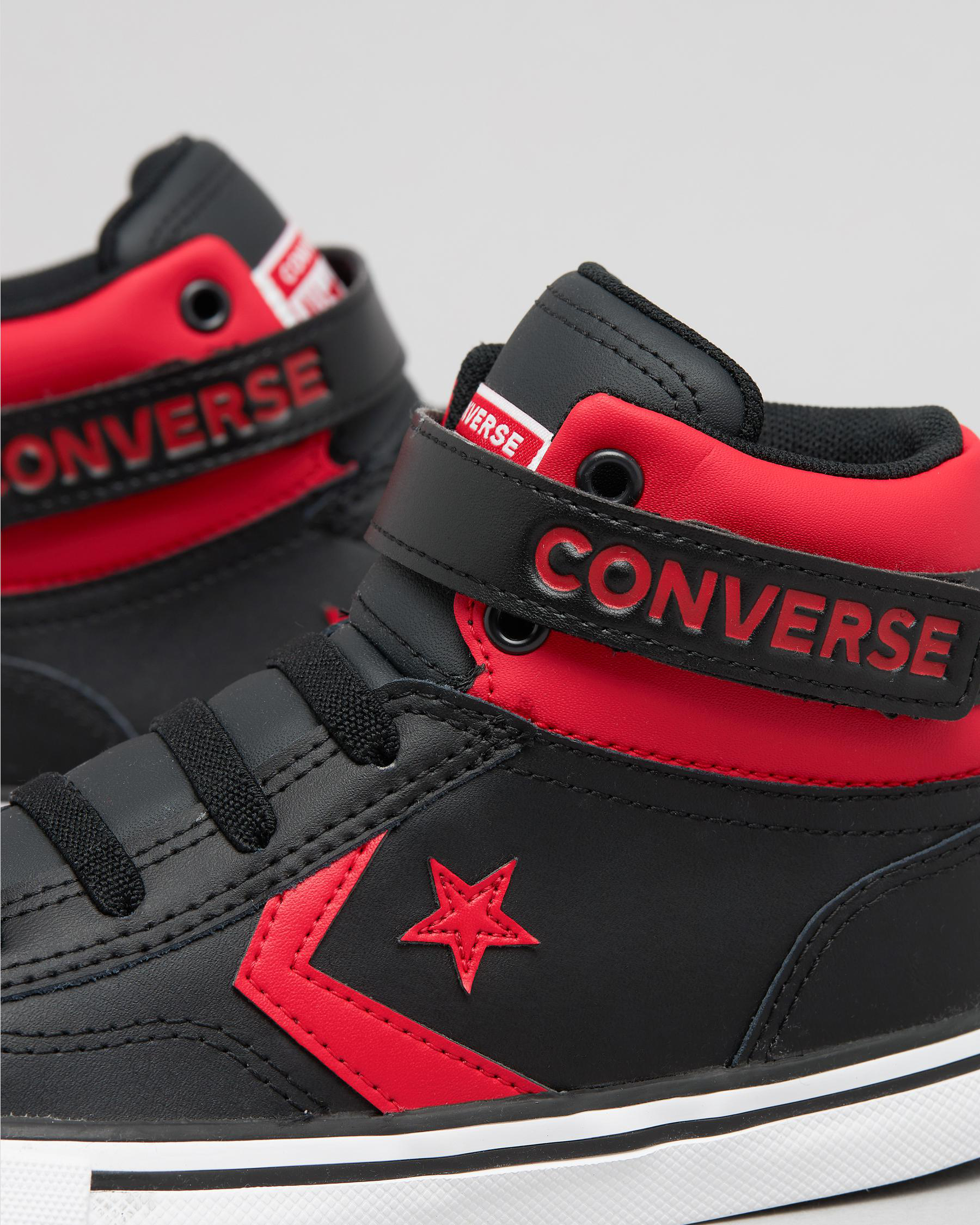 Shop Converse Junior Boys' Pro Blaze Strap Varsity Shoes In Black/red ...