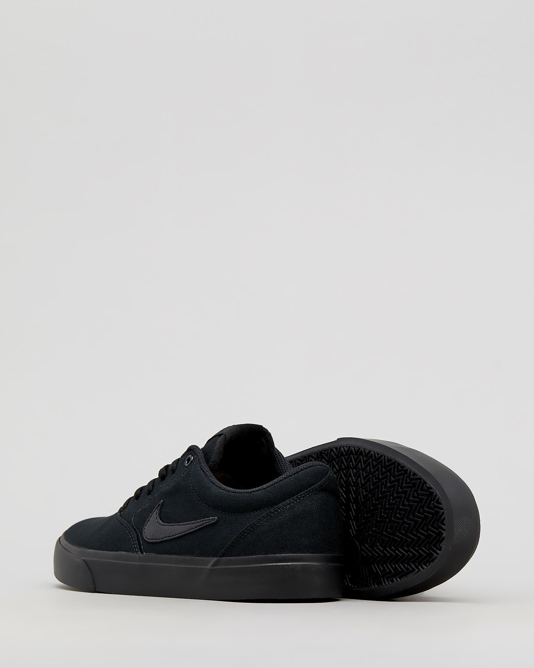 Shop Nike Boys' Charge Shoes In Black/black - Fast Shipping & Easy ...