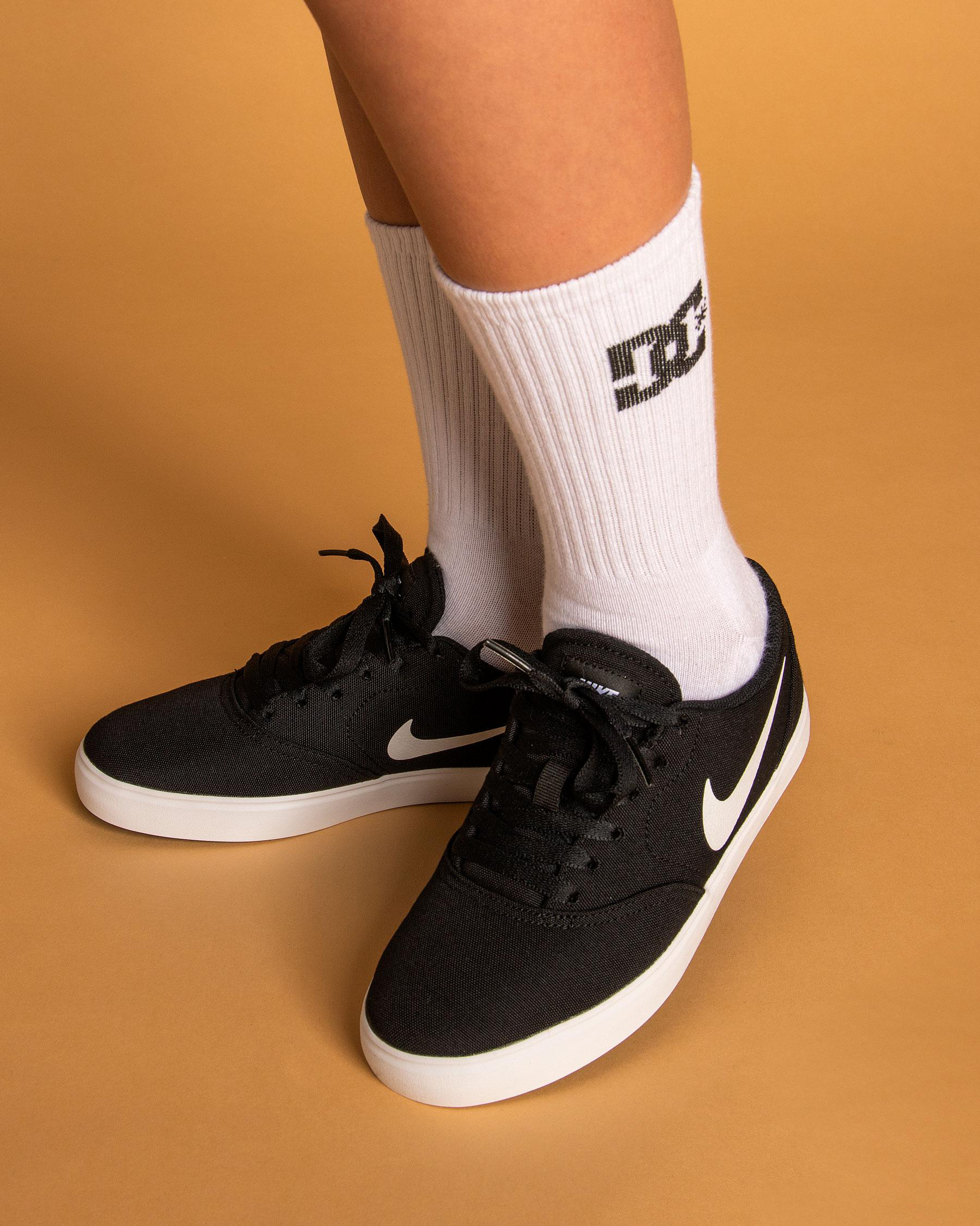 Shop Nike Boys' SB Check Shoes In Black/white - Fast Shipping & Easy ...