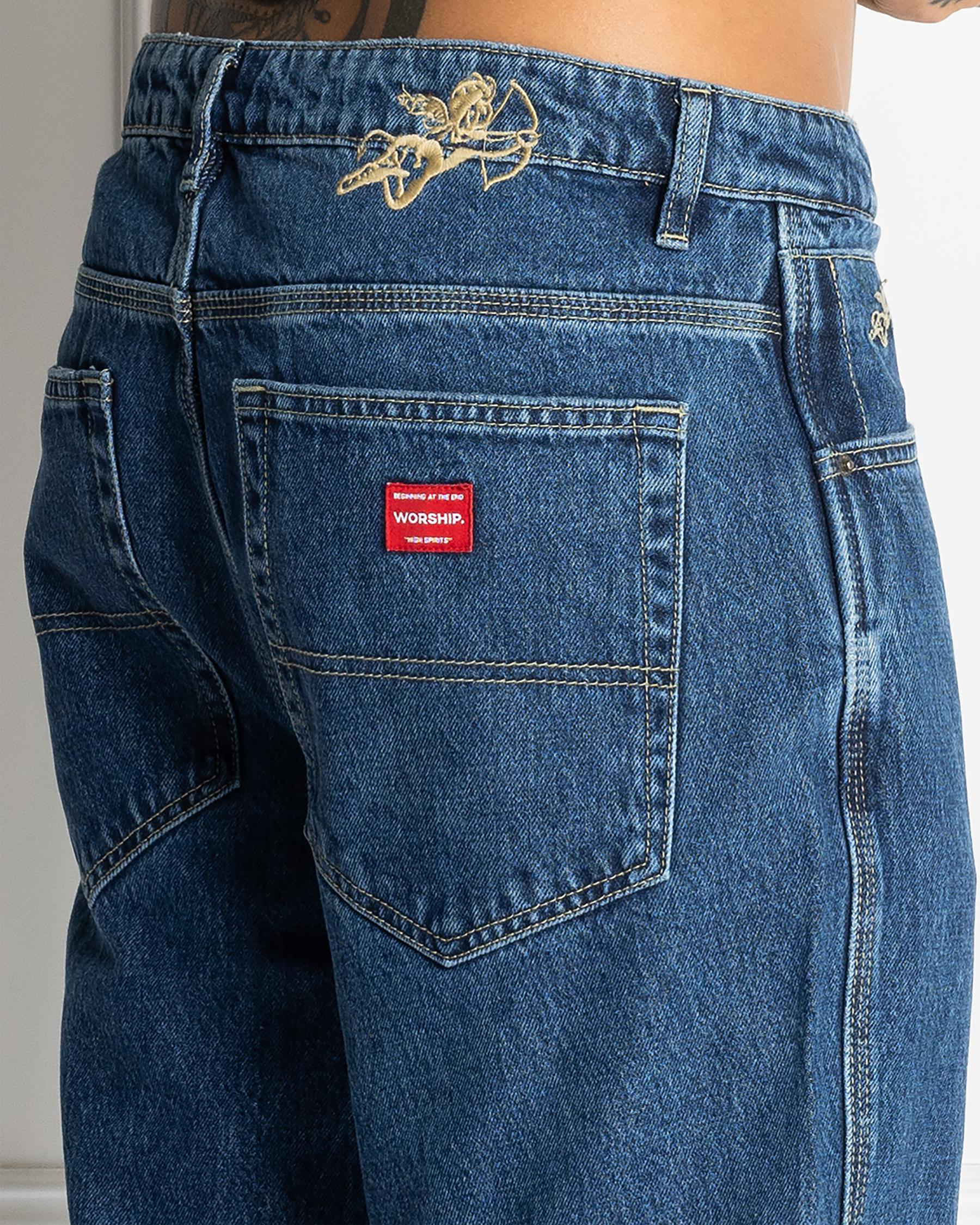 Shop Worship Supplies Lounger Jeans In Worn Blue Rinse - Fast Shipping ...