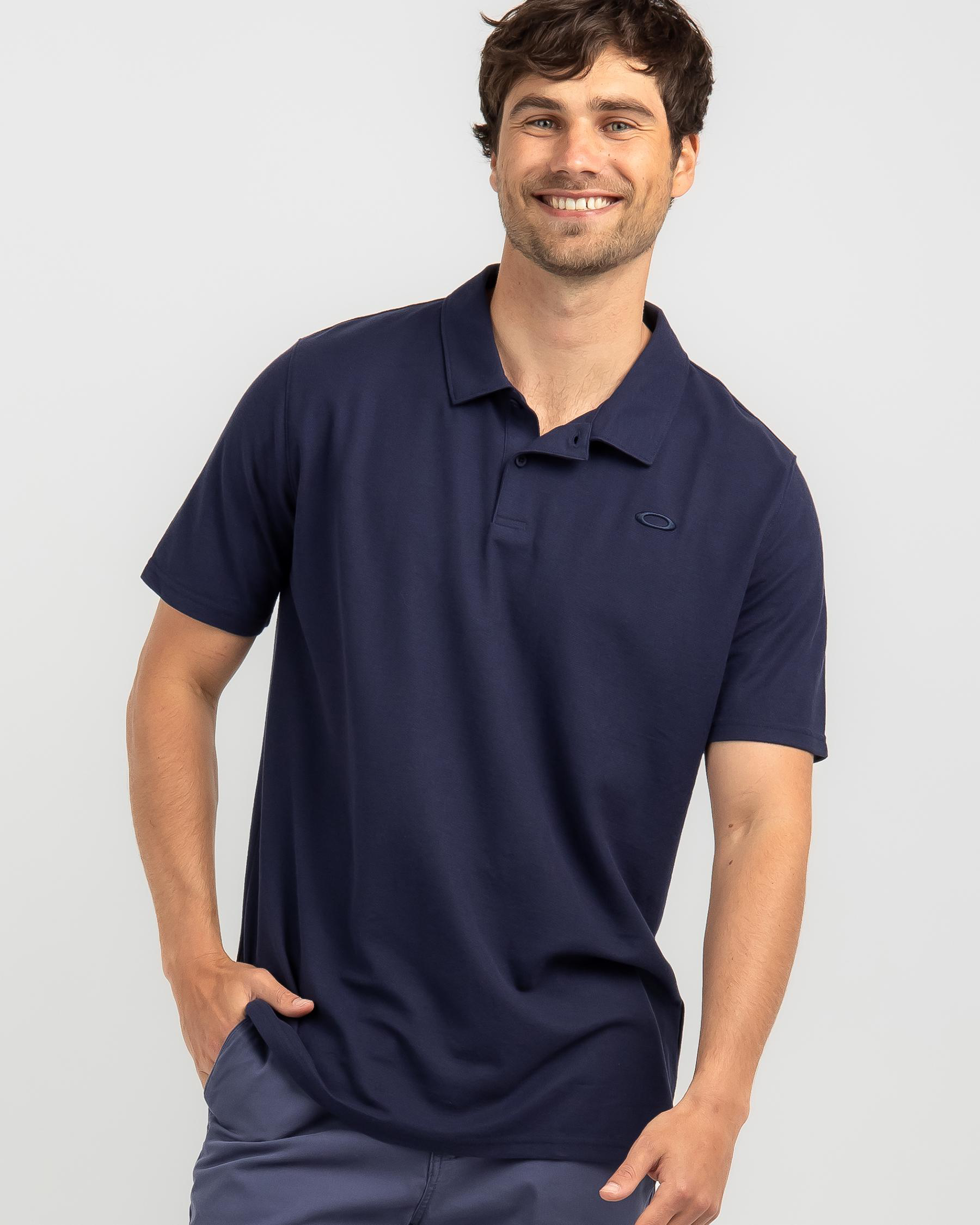 Shop Oakley Relax Urban Polo Shirt In Fathom - Fast Shipping & Easy ...