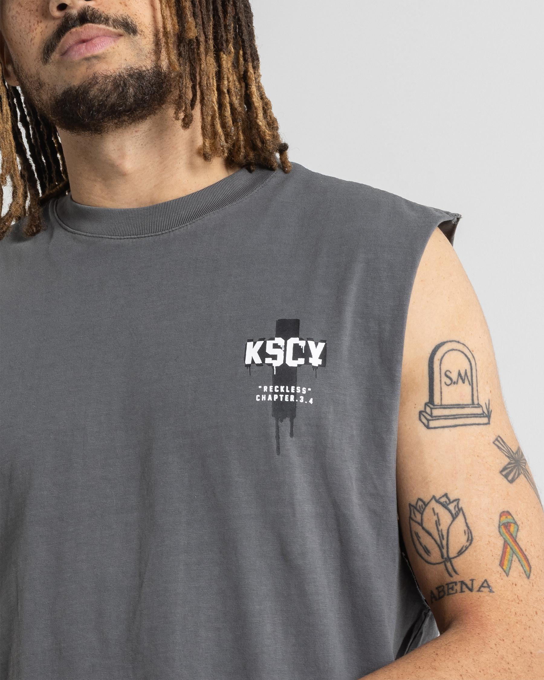 Shop Kiss Chacey Ripped Relaxed Muscle Tank In Pigment Charcoal - Fast ...