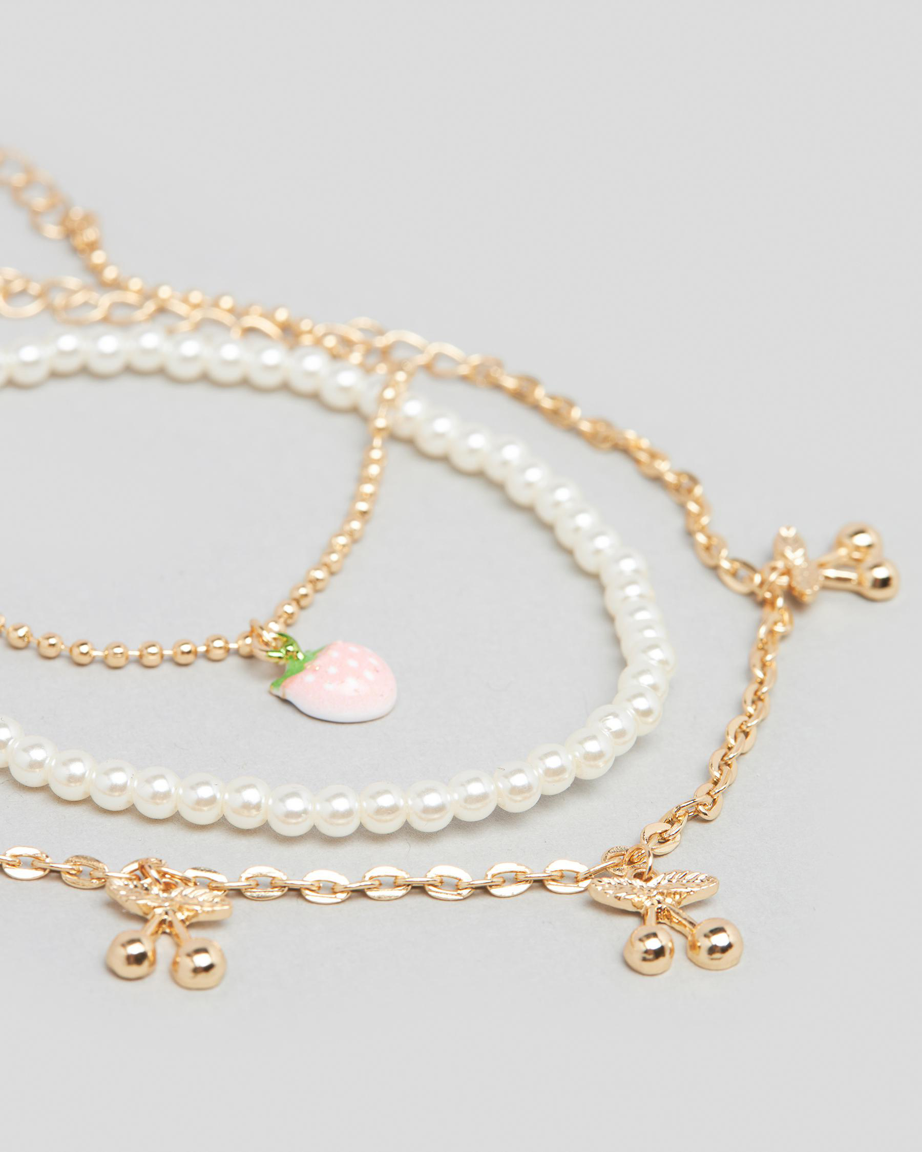 Shop Karyn In LA Milly Anklet Pack In White/shiny Light Gold - Fast ...