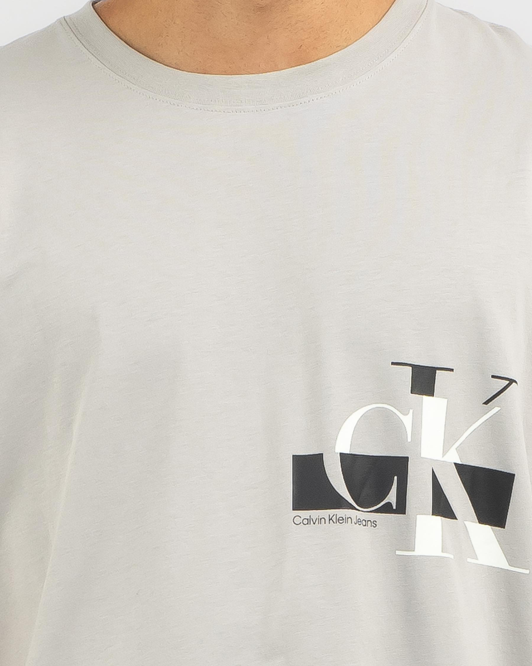 Shop Calvin Klein Glitched CK Logo T-Shirt In Porpoise - Fast Shipping ...