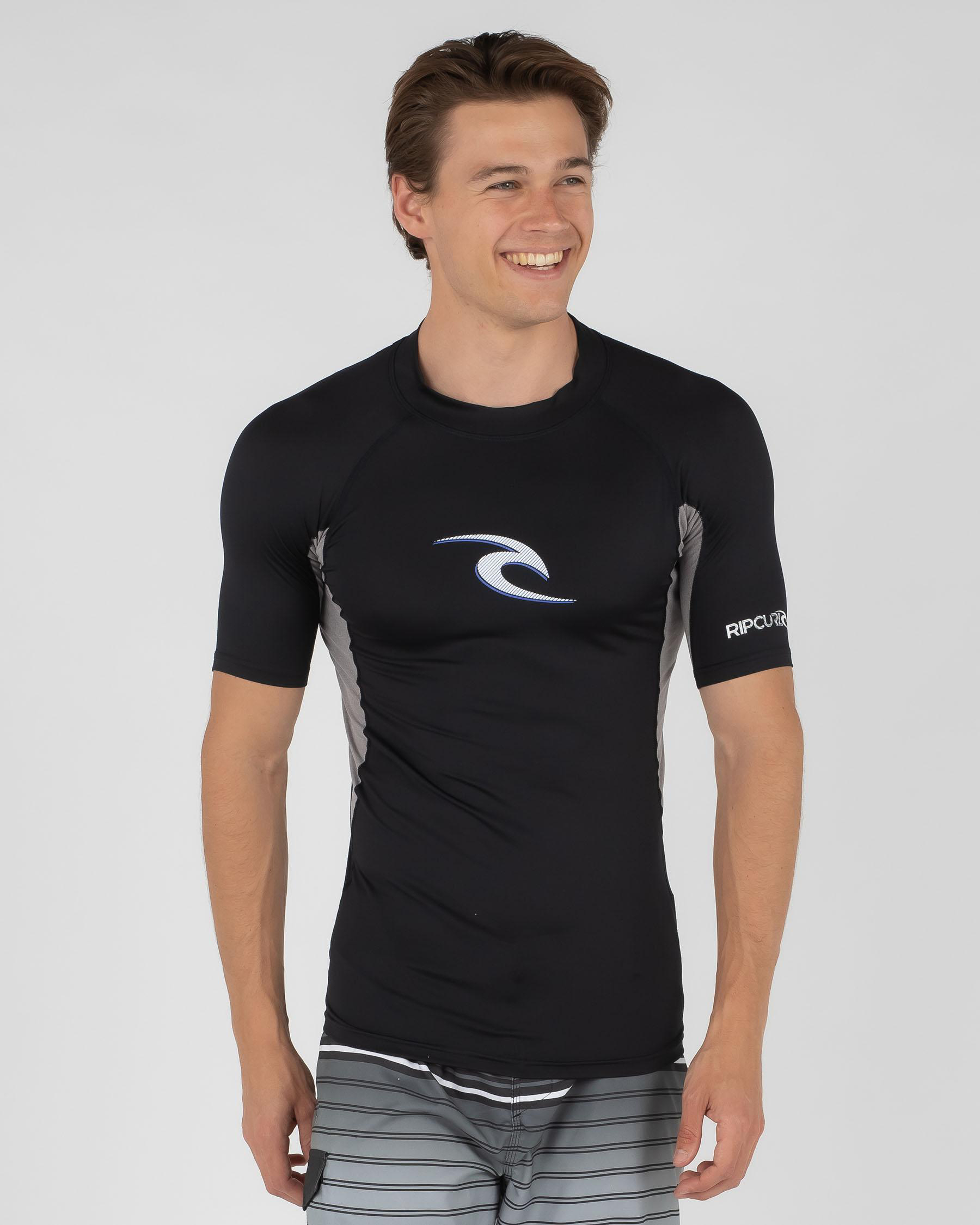 Shop Rip Curl Wave Short Sleeve Rash Vest In Black - Fast Shipping ...