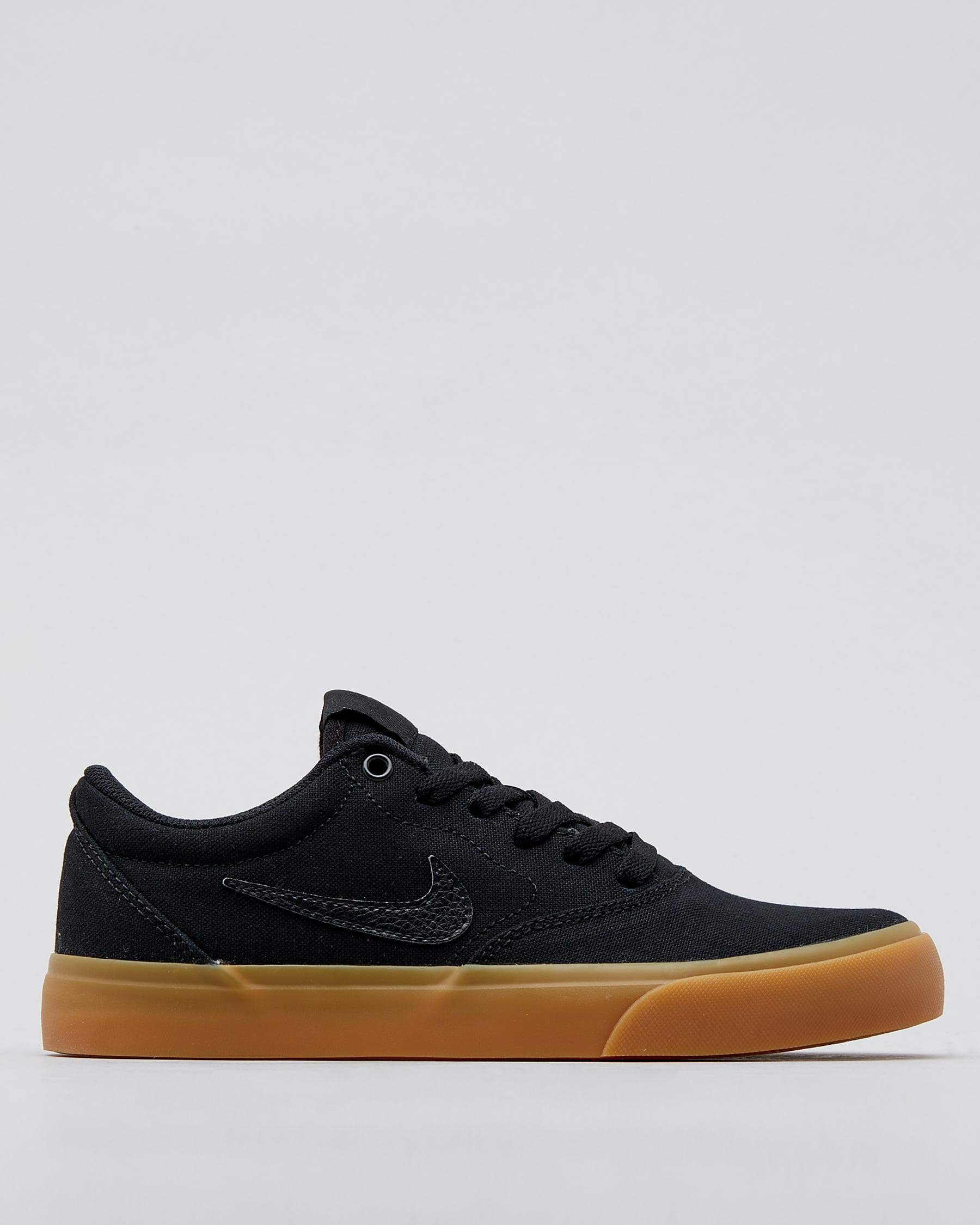 Shop Nike Boys' Charge Shoes In Black/black-gum - Fast Shipping & Easy ...