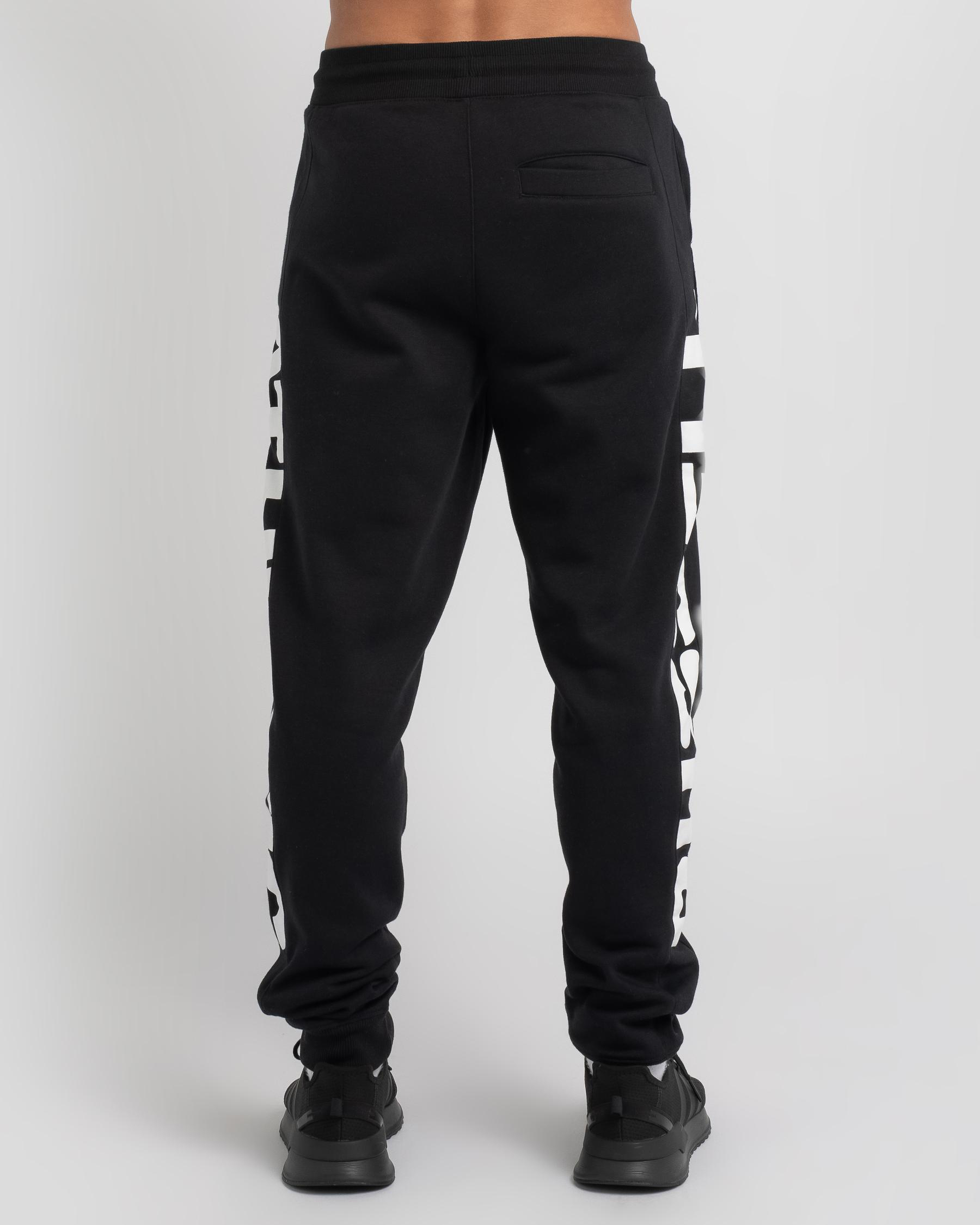 Shop Russell Athletic Print Label Track Pants In Black - Fast Shipping ...