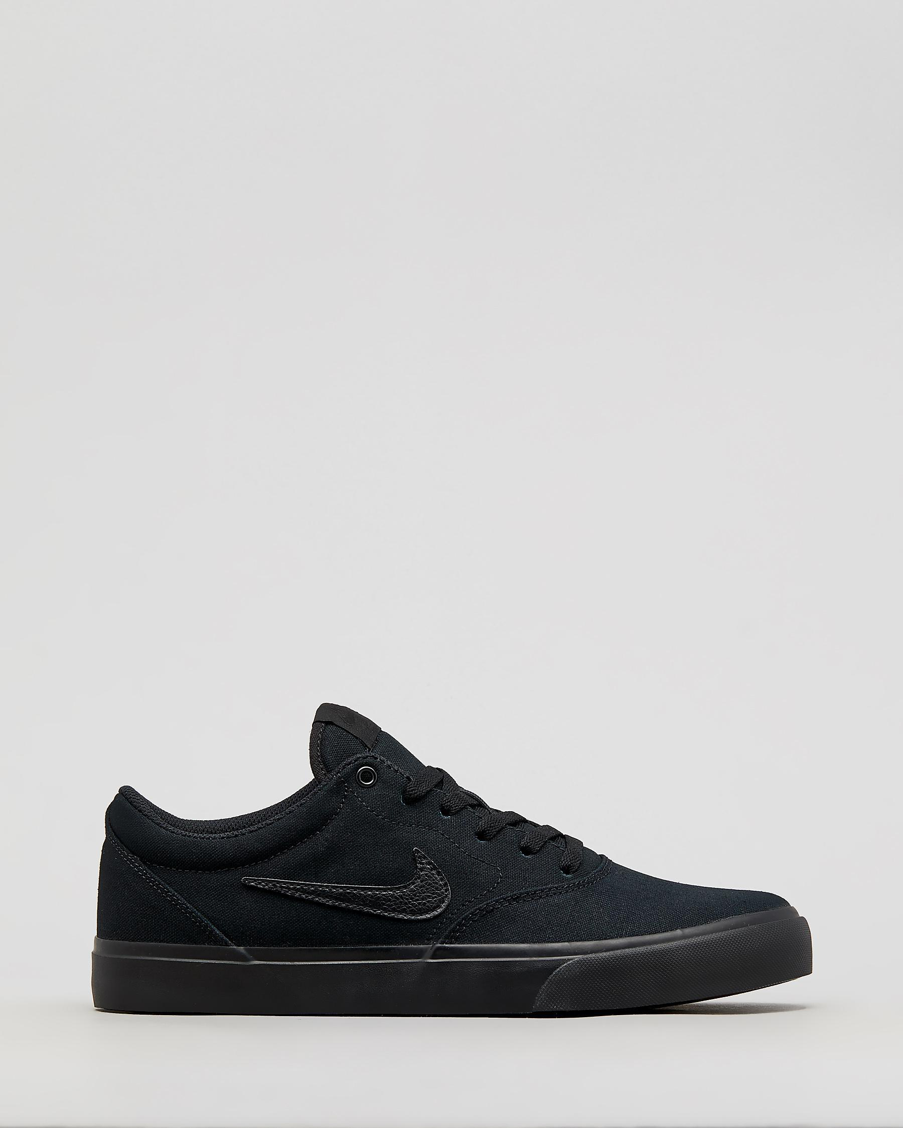 Shop Nike Boys' Charge Shoes In Black/black - Fast Shipping & Easy ...