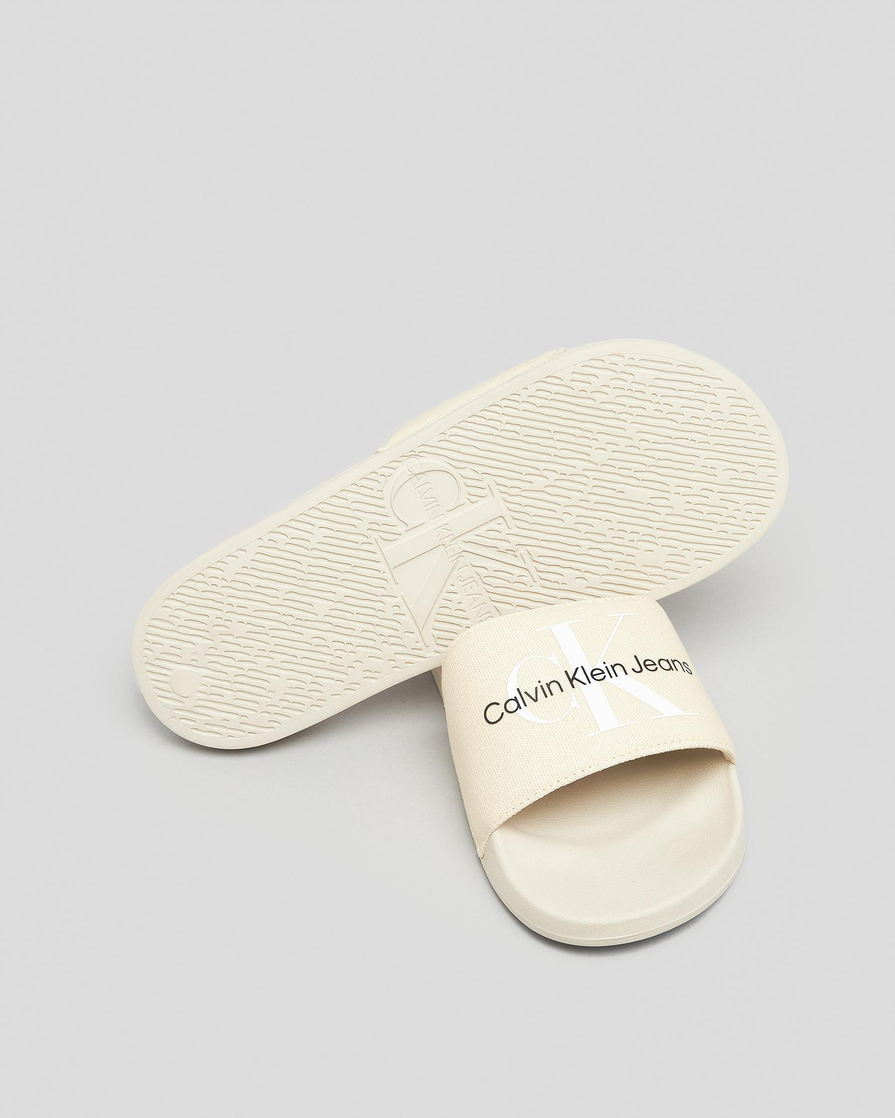 Shop Calvin Klein Monogram Slide In Eggshell - Fast Shipping & Easy ...