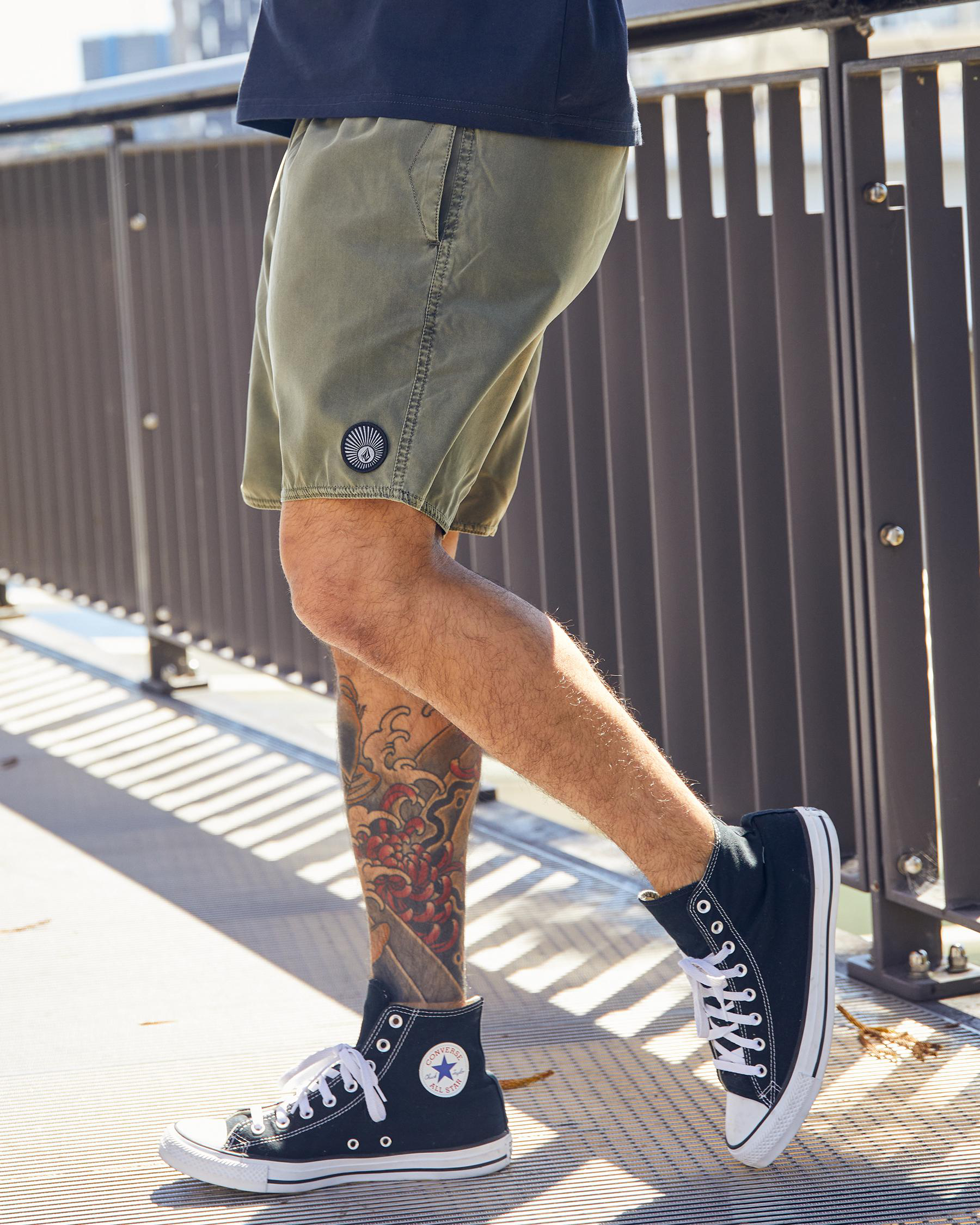 Shop Volcom Centre 17" Trunk Board Shorts In Military - Fast Shipping ...