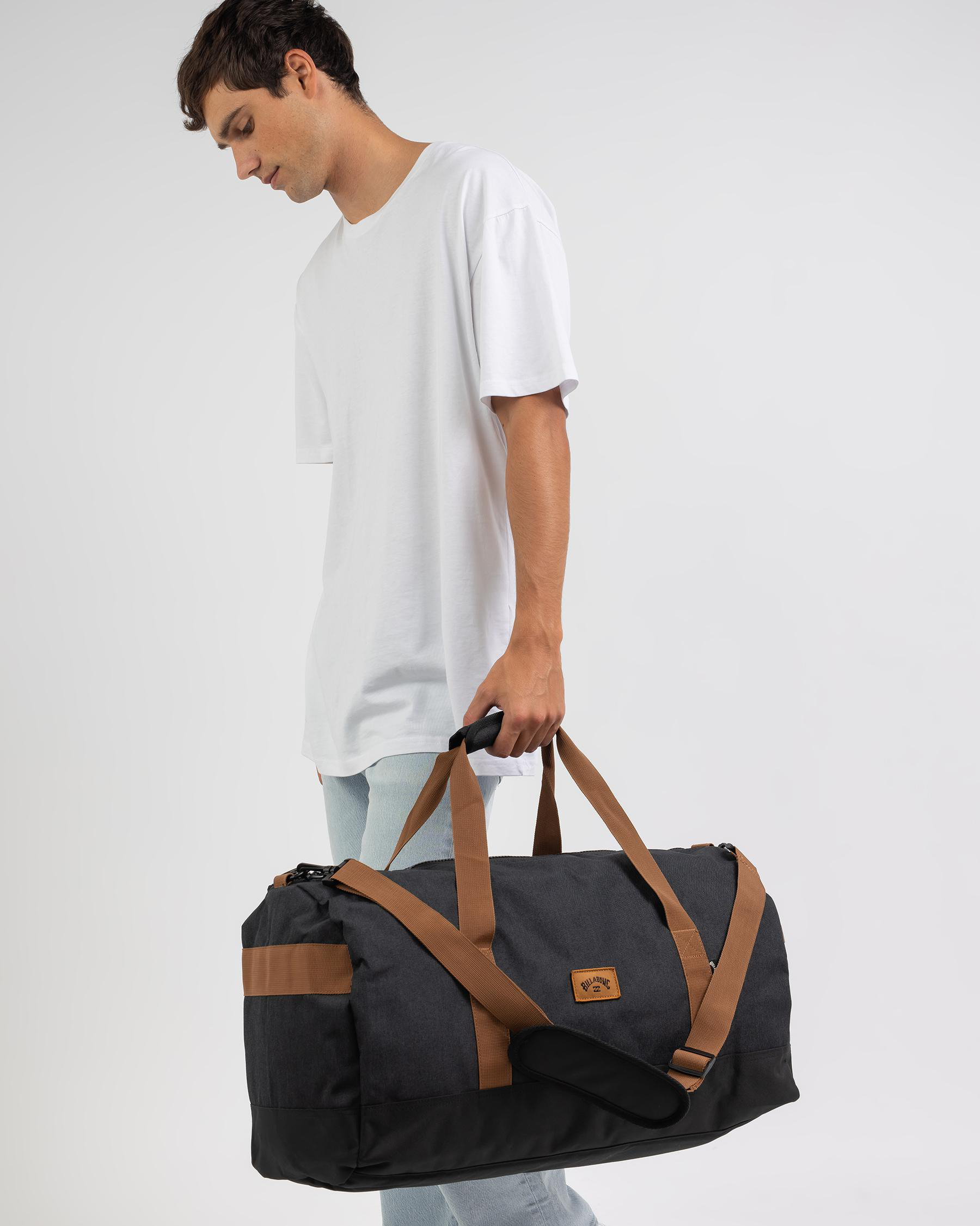 Shop Billabong Transit Duffle Bag In Black/tan - Fast Shipping & Easy ...