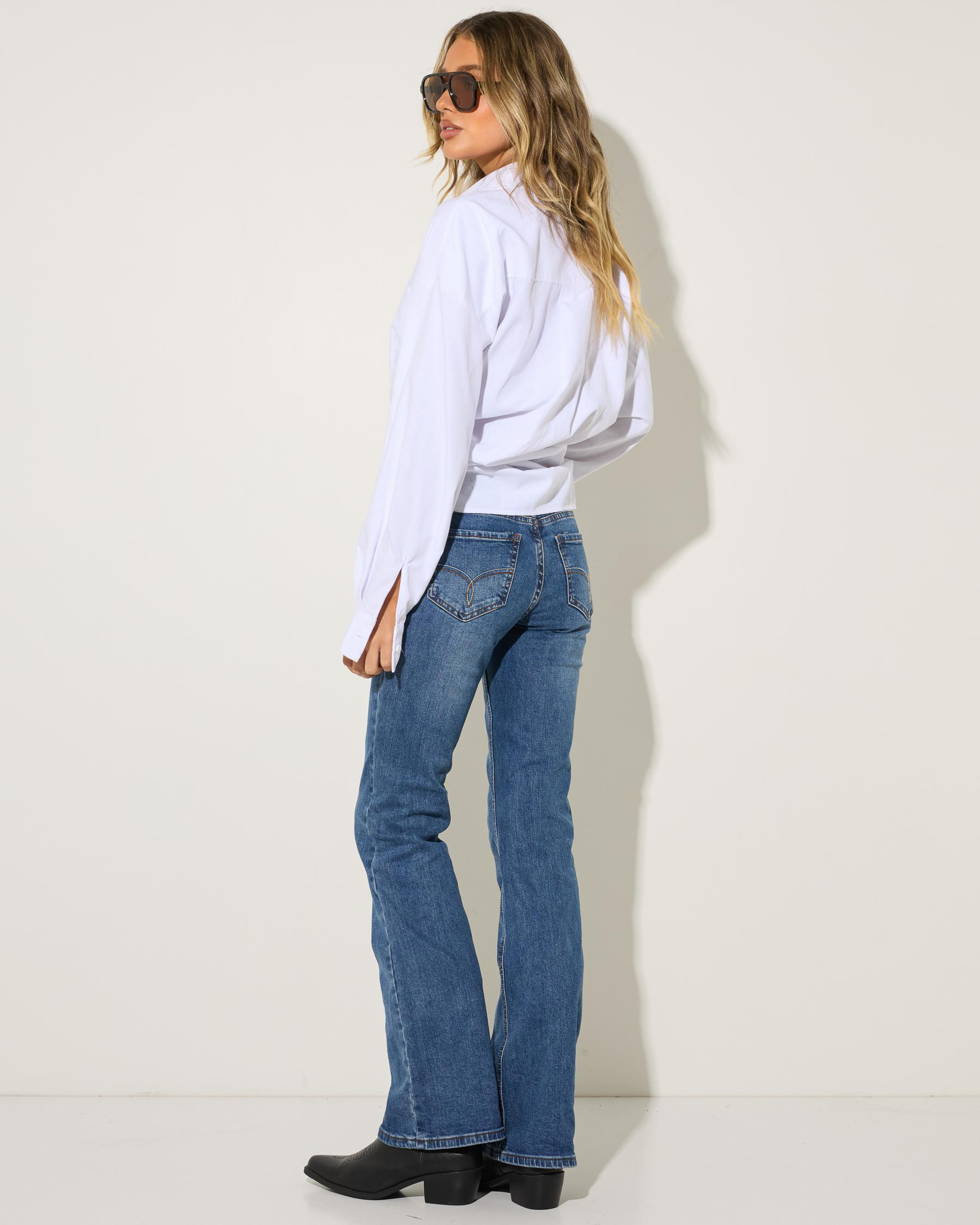 Shop DESU Stratford Low Waist Bootleg Jeans In Blasted Dark Blue - Fast ...