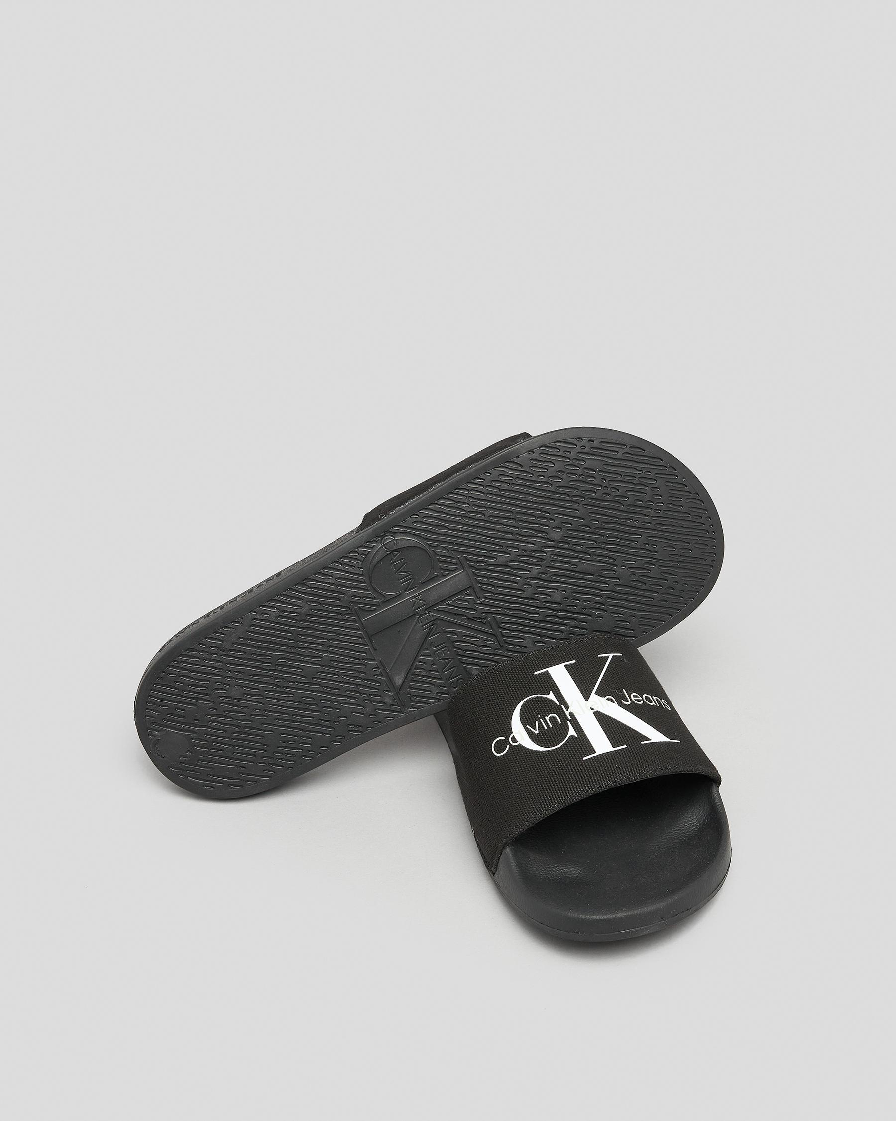 Shop Calvin Klein Slide Monogram CO In Black - Fast Shipping & Easy ...