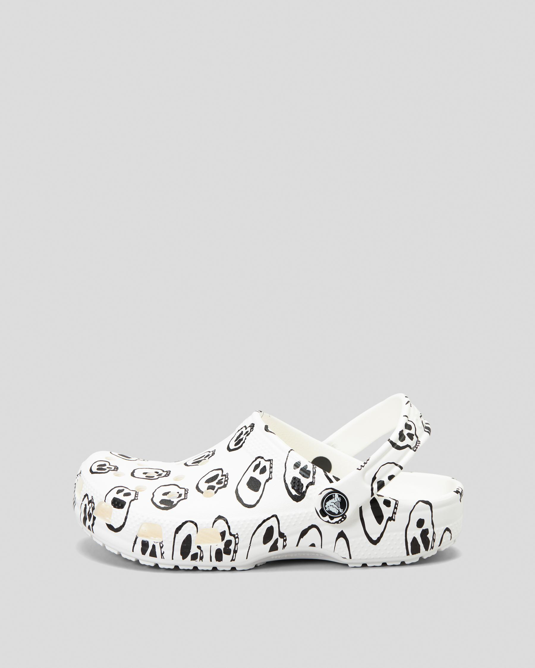 Shop Crocs Kids' Classic Skull Print Clogs In White/black - Fast ...