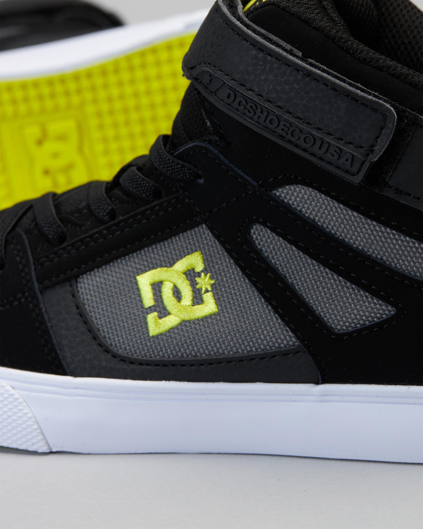Shop DC Shoes Boys' Pure Hi-Top EV Shoes In Black/soft Lime/black ...