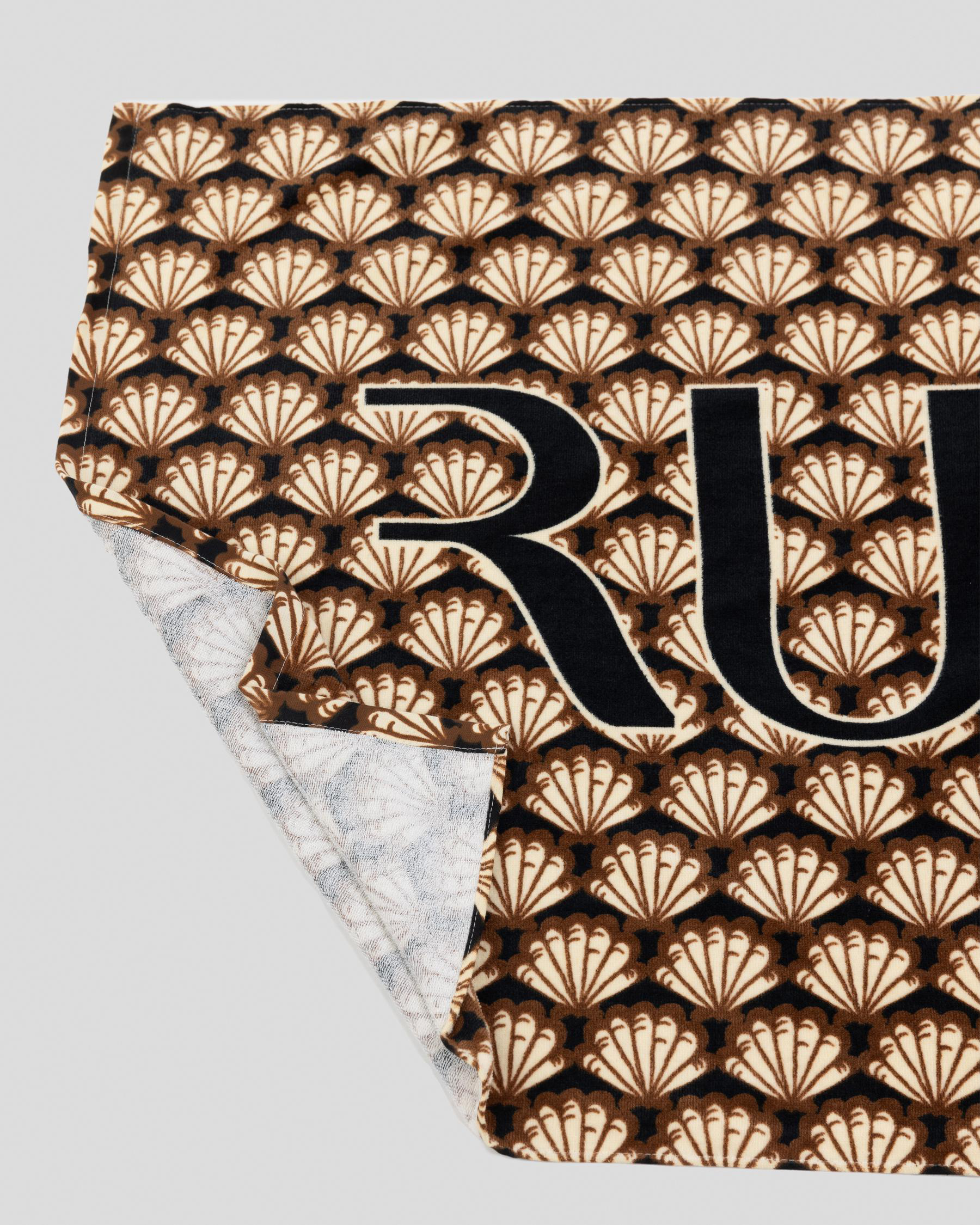 Shop Rusty Sun Kissed Beach Towel In Black - Fast Shipping & Easy ...