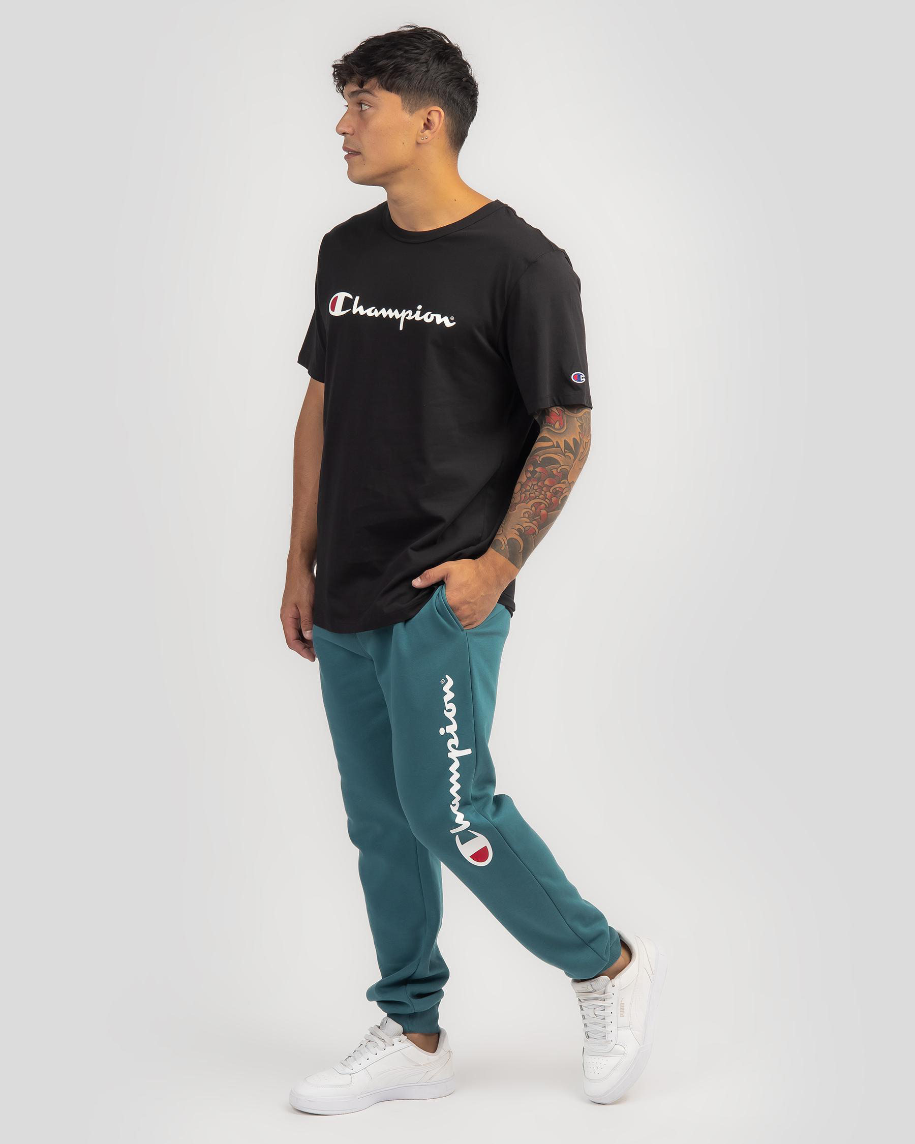 Shop Champion Logo Cuff Track Pants In Miss America - Fast Shipping ...