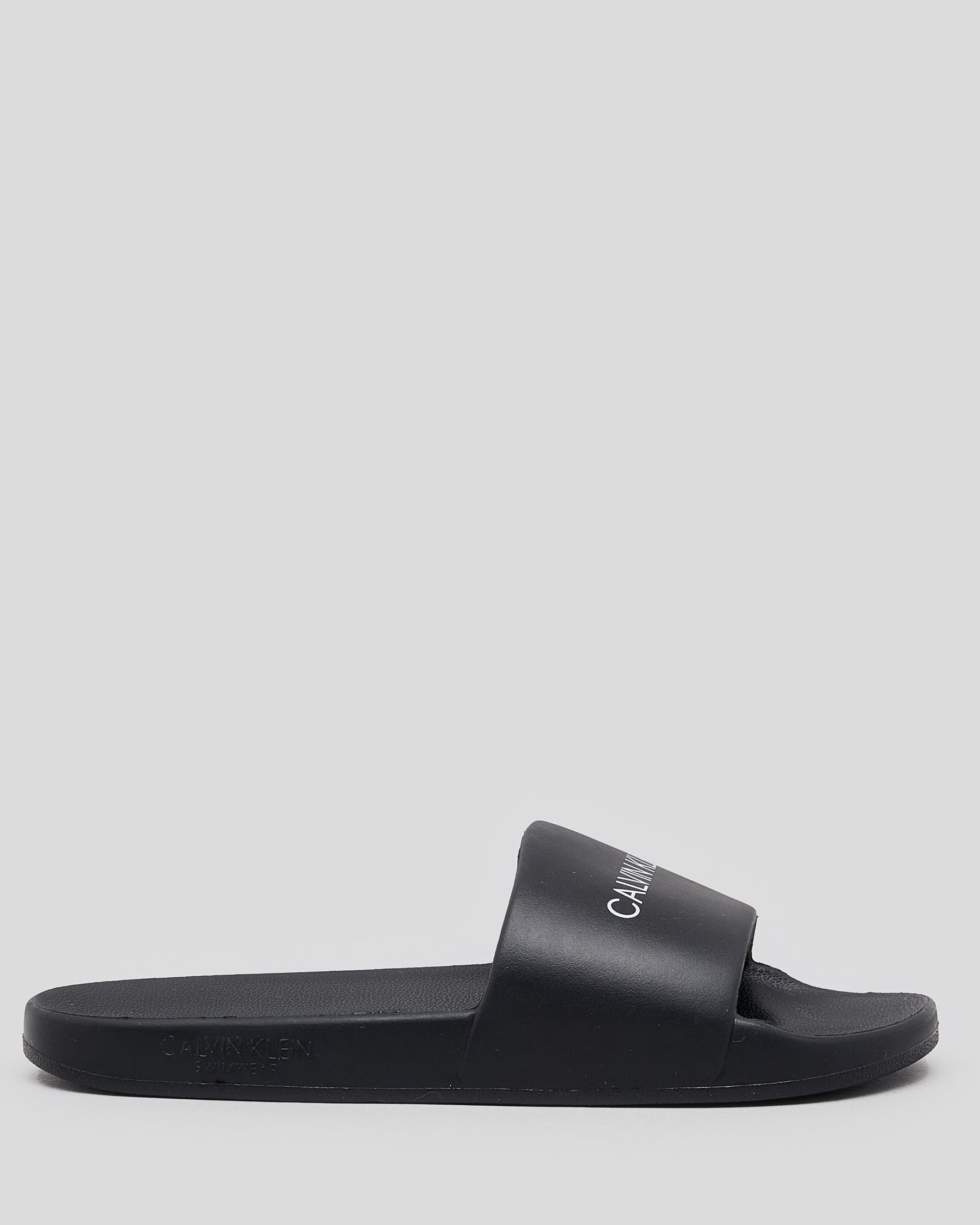 Shop Calvin Klein Girls' One Mold Slide In Pvh Black - Fast Shipping ...