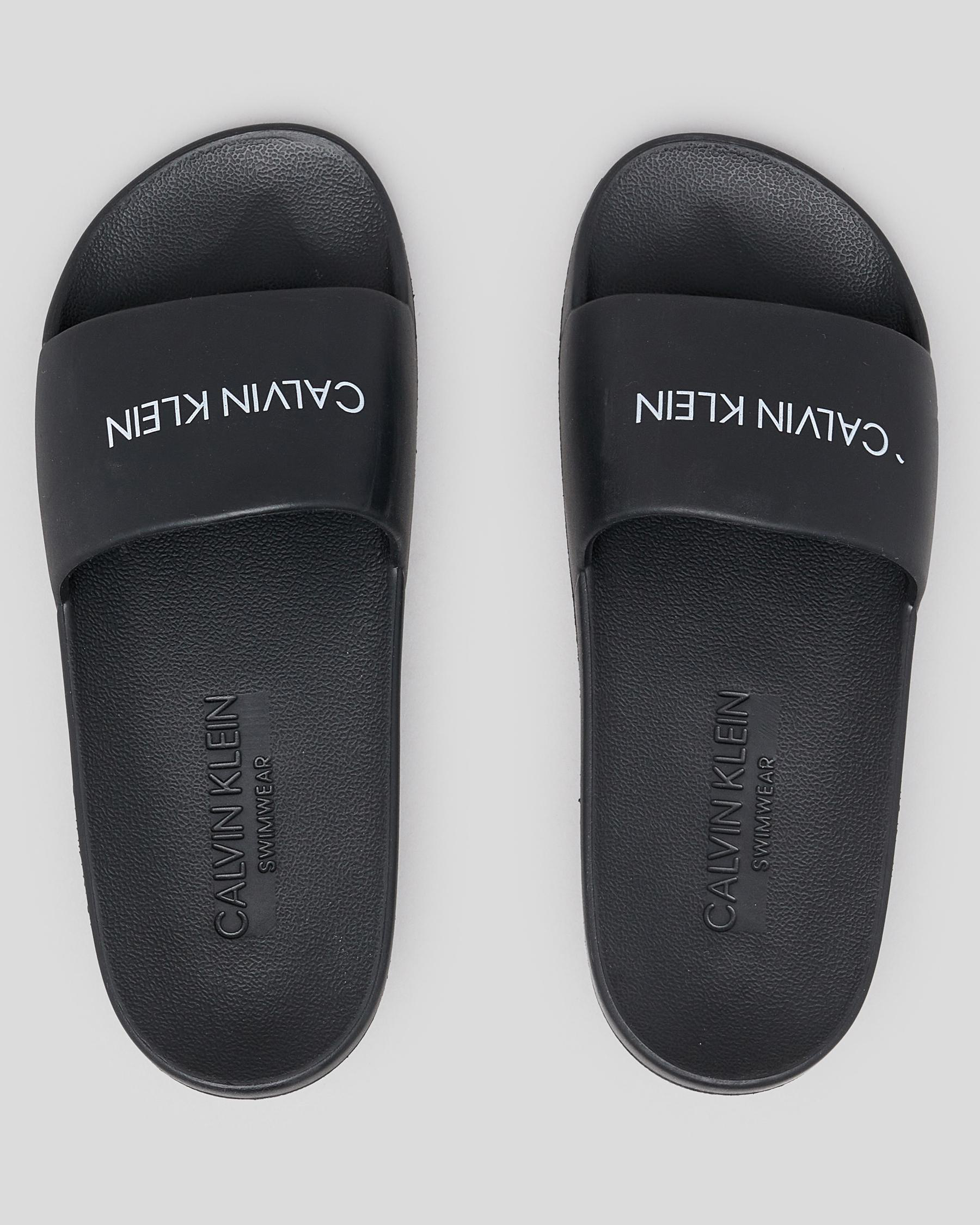 Shop Calvin Klein Girls' One Mold Slide In Pvh Black - Fast Shipping ...