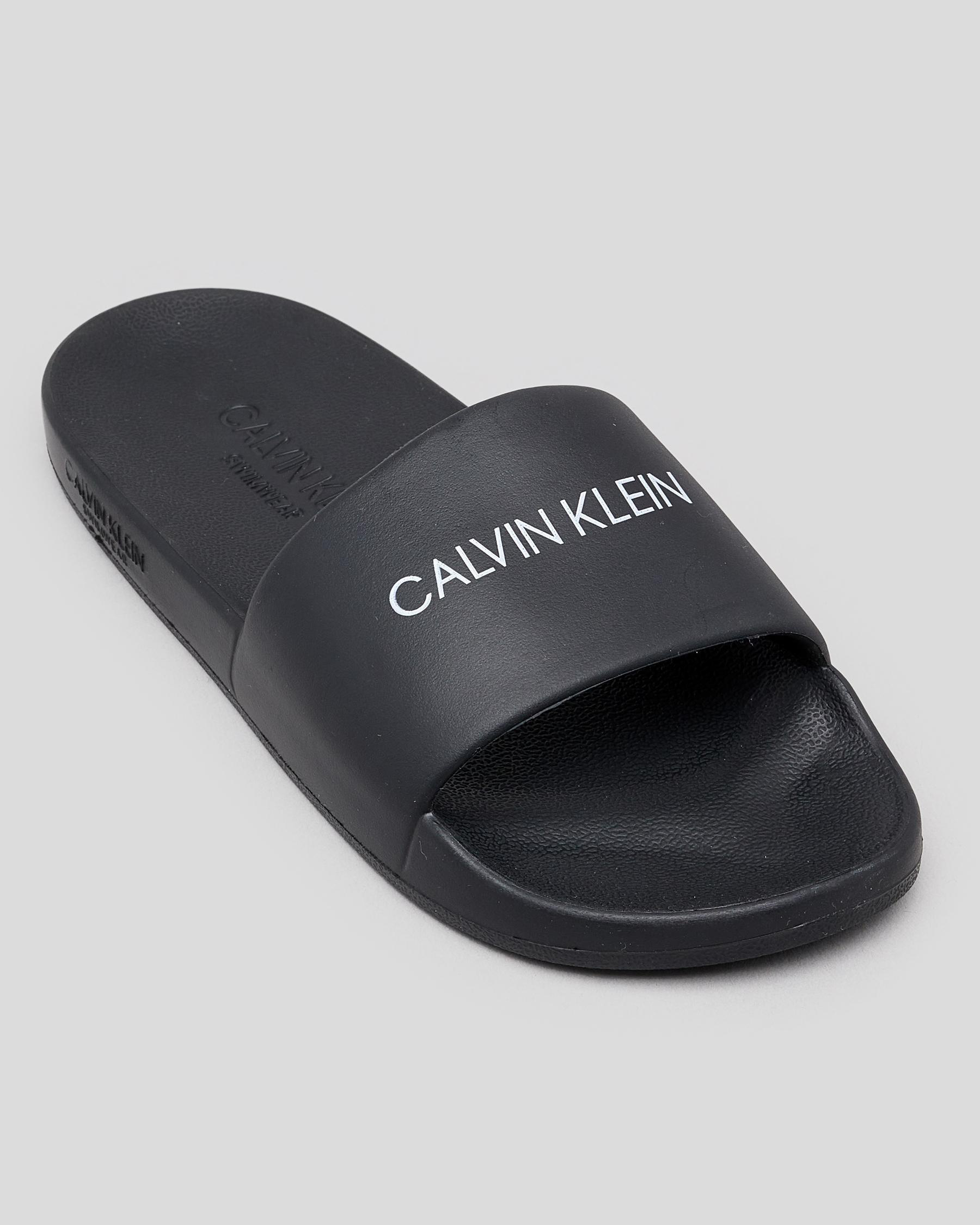 Shop Calvin Klein Girls' One Mold Slide In Pvh Black - Fast Shipping ...