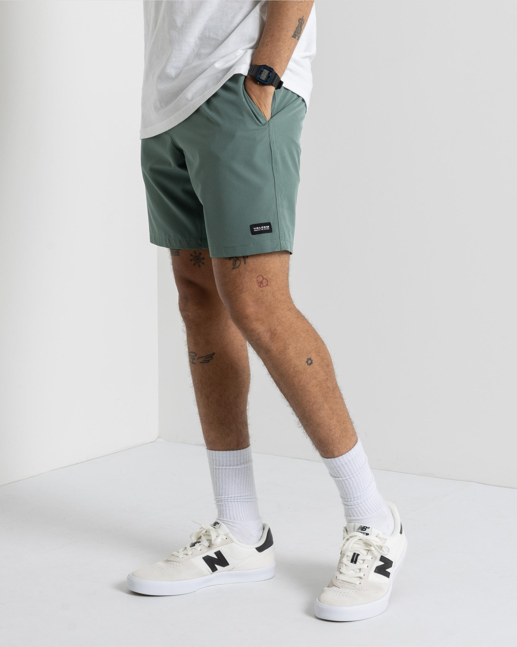 Shop Volcom Stones Hybrid Elastic Waist Shorts In Forest - Fast ...