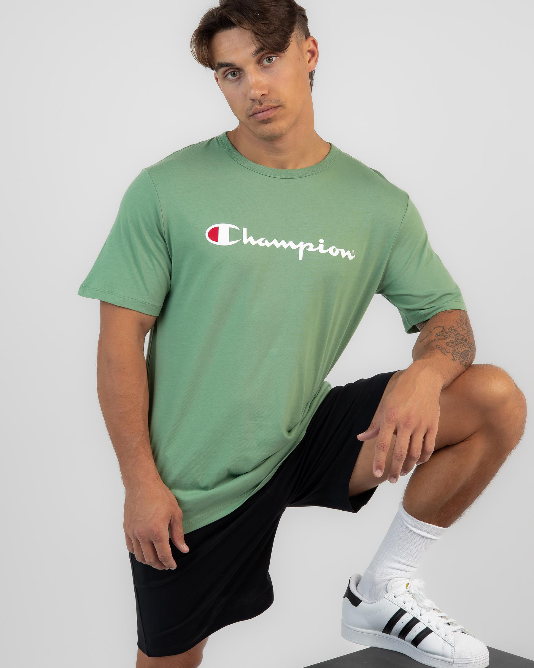 Shop Champion Logo T-Shirt In Outfield - Fast Shipping & Easy Returns ...