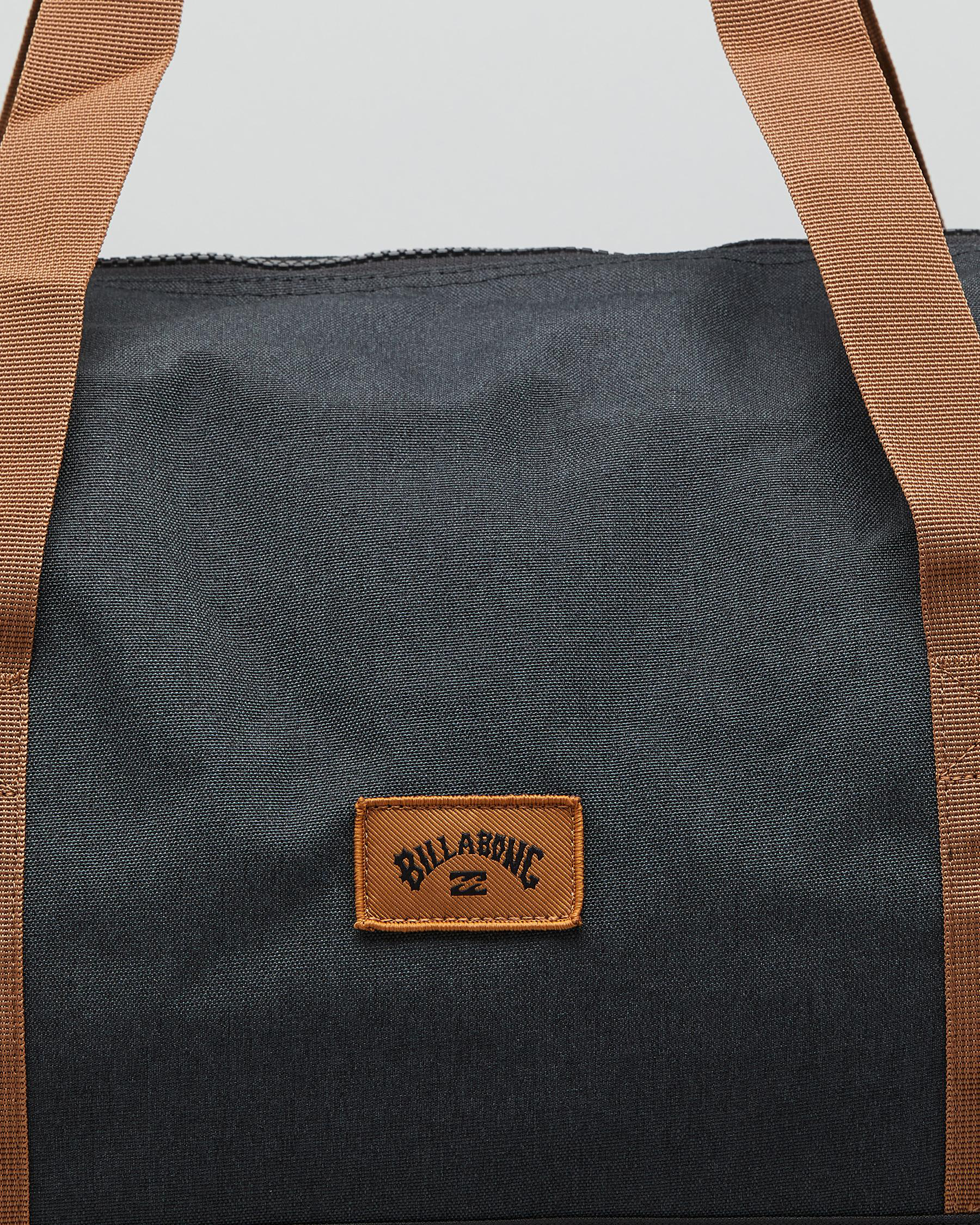 Shop Billabong Transit Duffle Bag In Black/tan - Fast Shipping & Easy ...