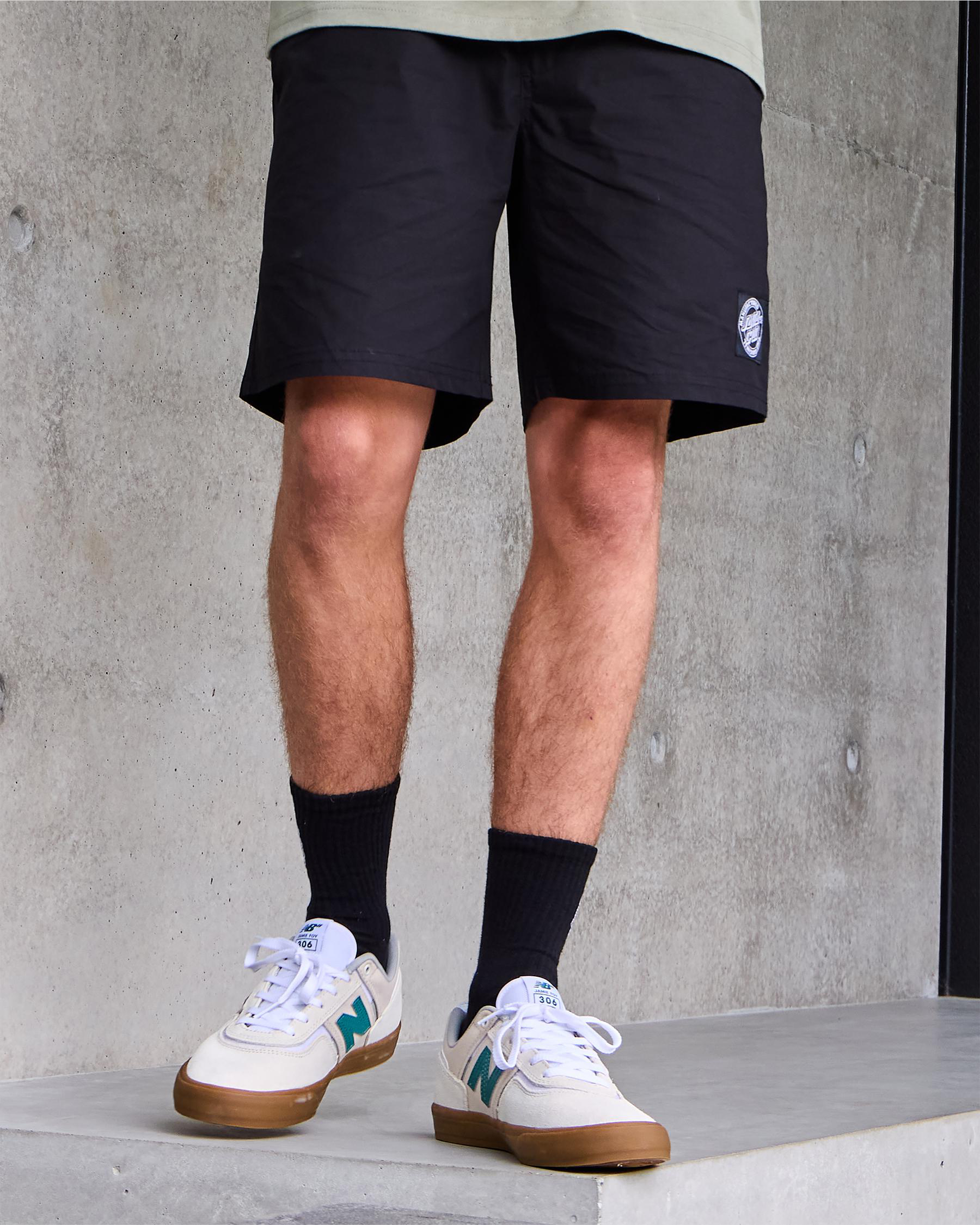 Shop Santa Cruz MFG Dot Cruzier Solid Shorts In Black - Fast Shipping ...