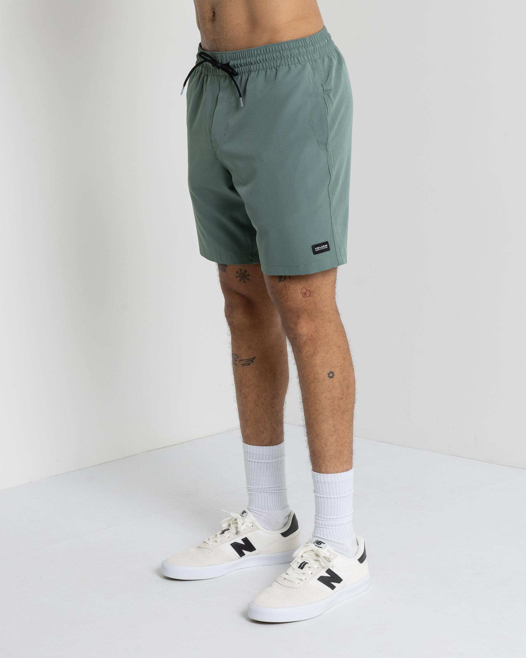Shop Volcom Stones Hybrid Elastic Waist Shorts In Forest - Fast ...