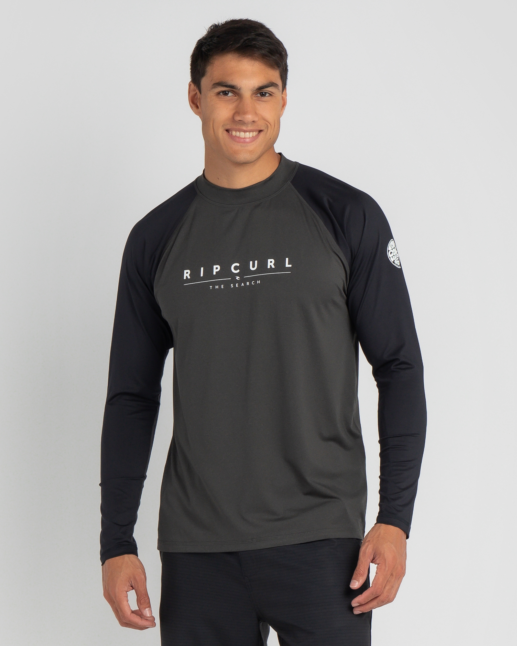 Shop Rip Curl Shockwave Relaxed Long Sleeve Rash Vest In Black Marle ...