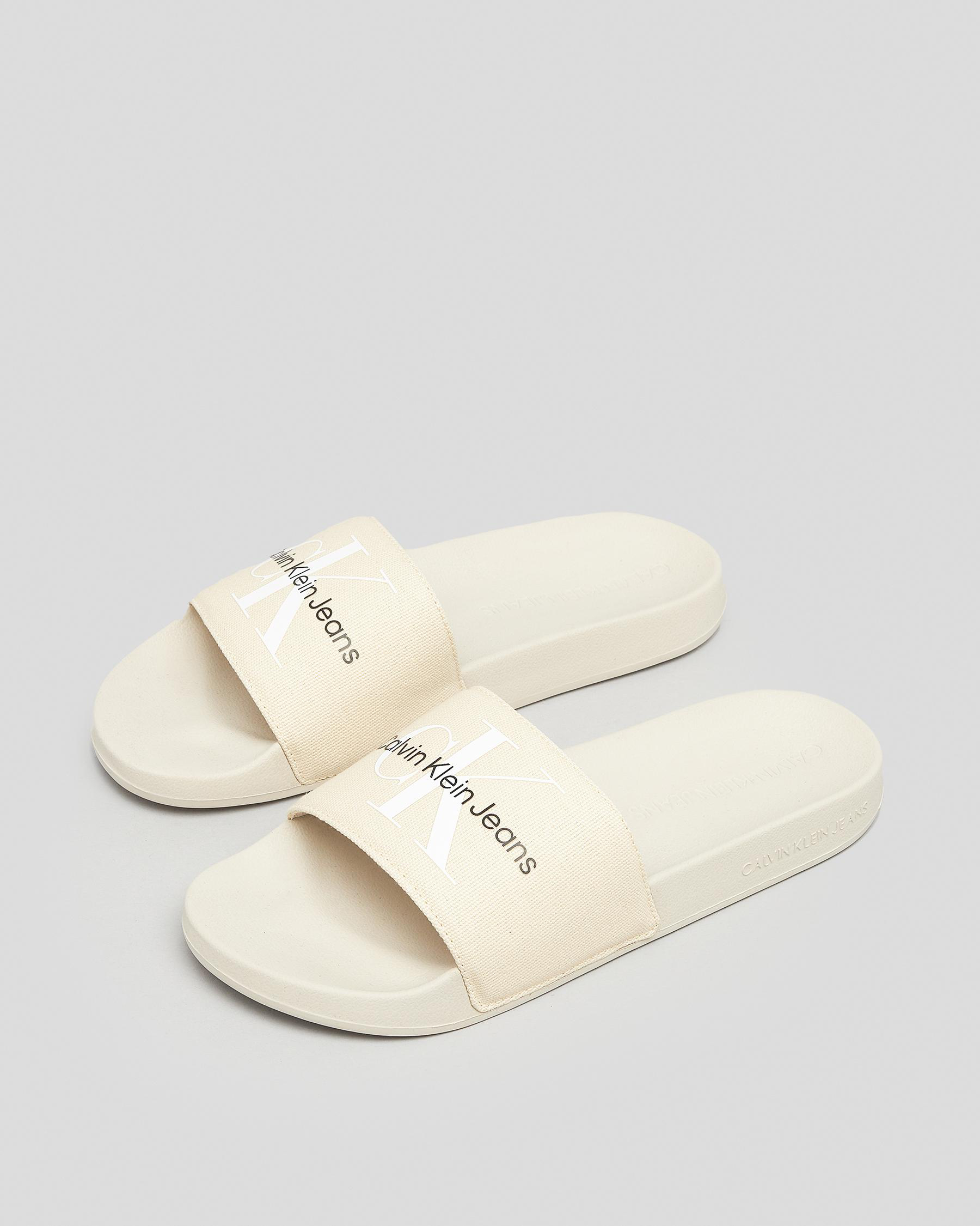 Shop Calvin Klein Monogram Slide In Eggshell - Fast Shipping & Easy ...