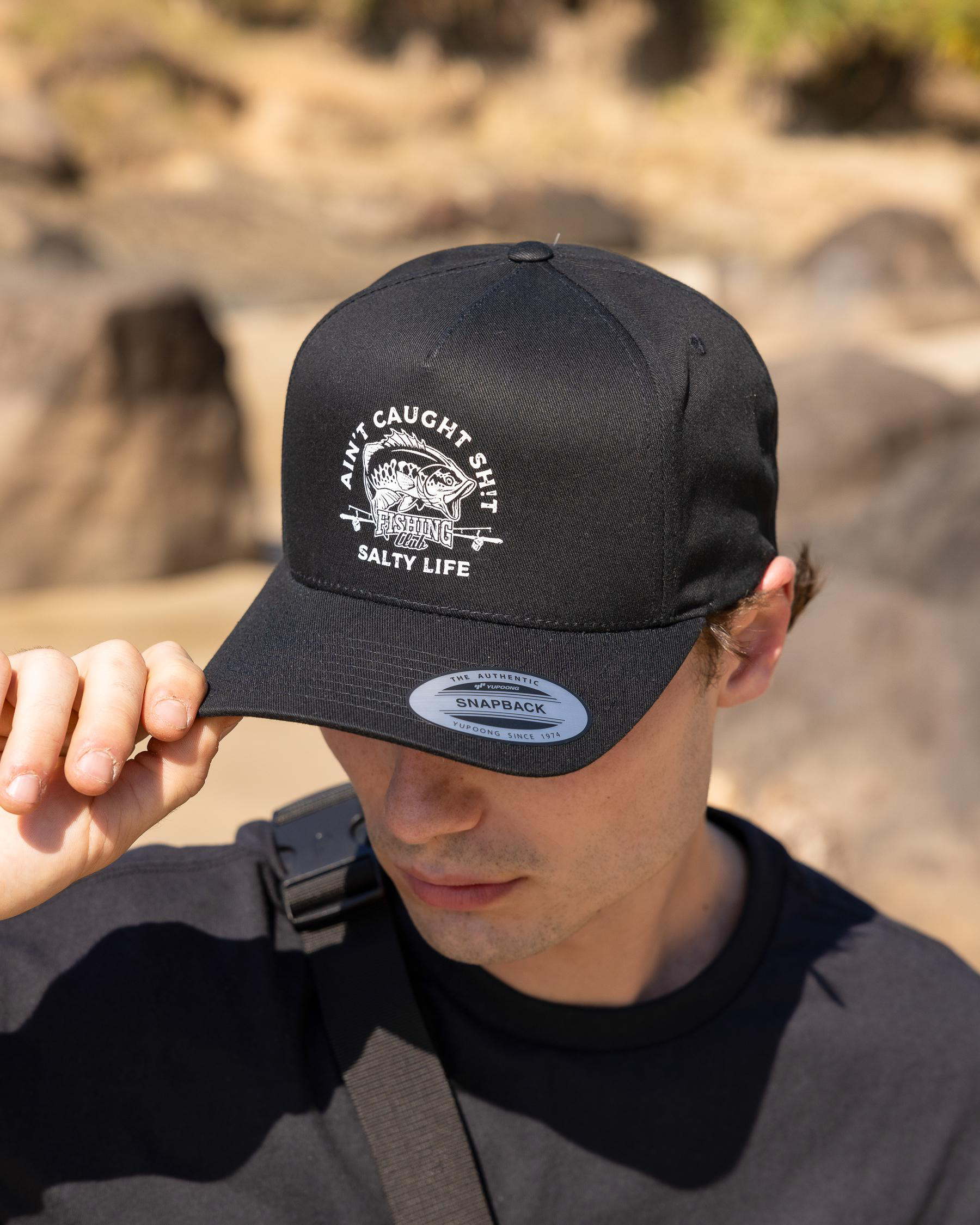 Shop Salty Life Fishing Club Snapback Cap In Black - Fast Shipping ...