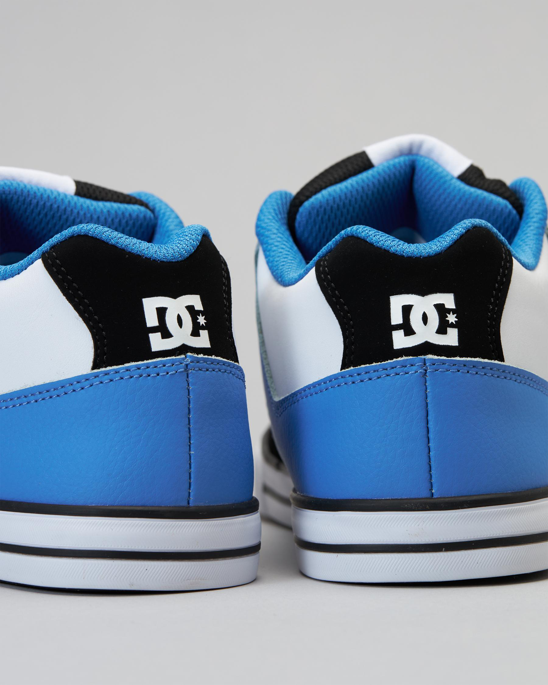Shop DC Shoes Boys' Pure Mid Shoes In Black/blue/grey - Fast Shipping ...