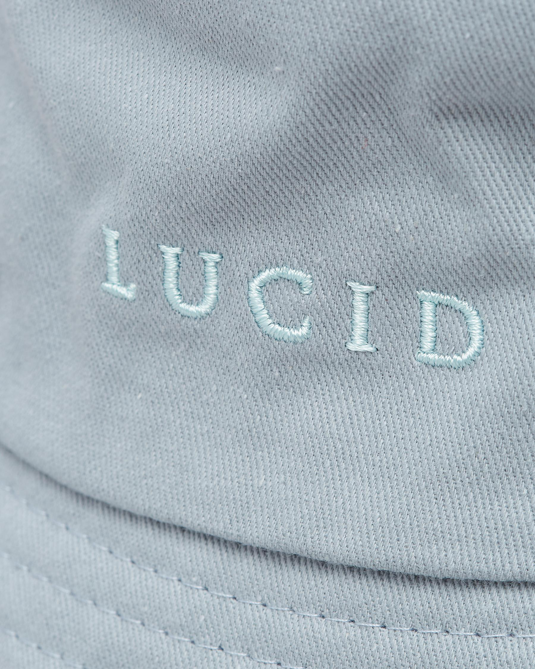 Shop Lucid Tinted Bucket Hat In Washed Blue - Fast Shipping & Easy ...