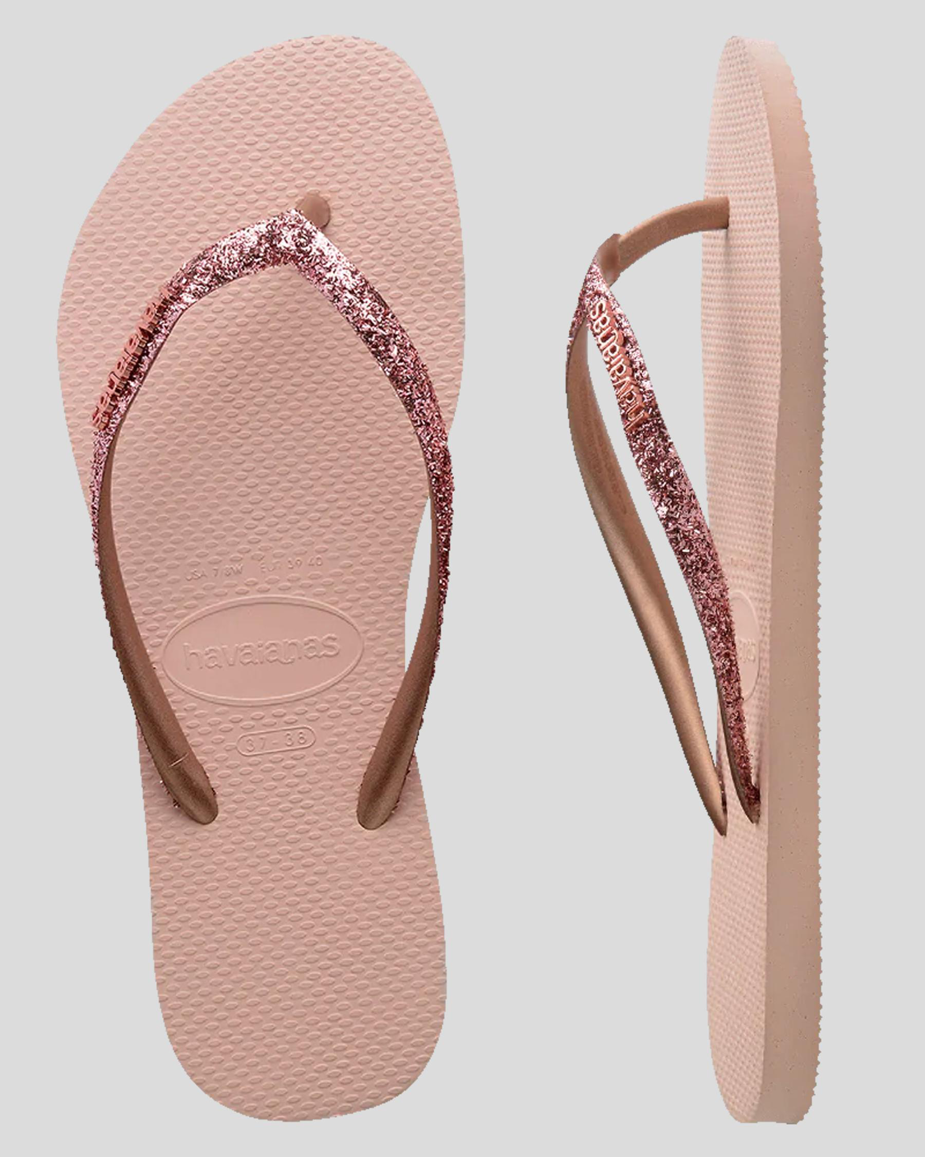 Shop Havaianas Slim Metal Logo Glitter II Thongs In Ballet Rose/golden ...