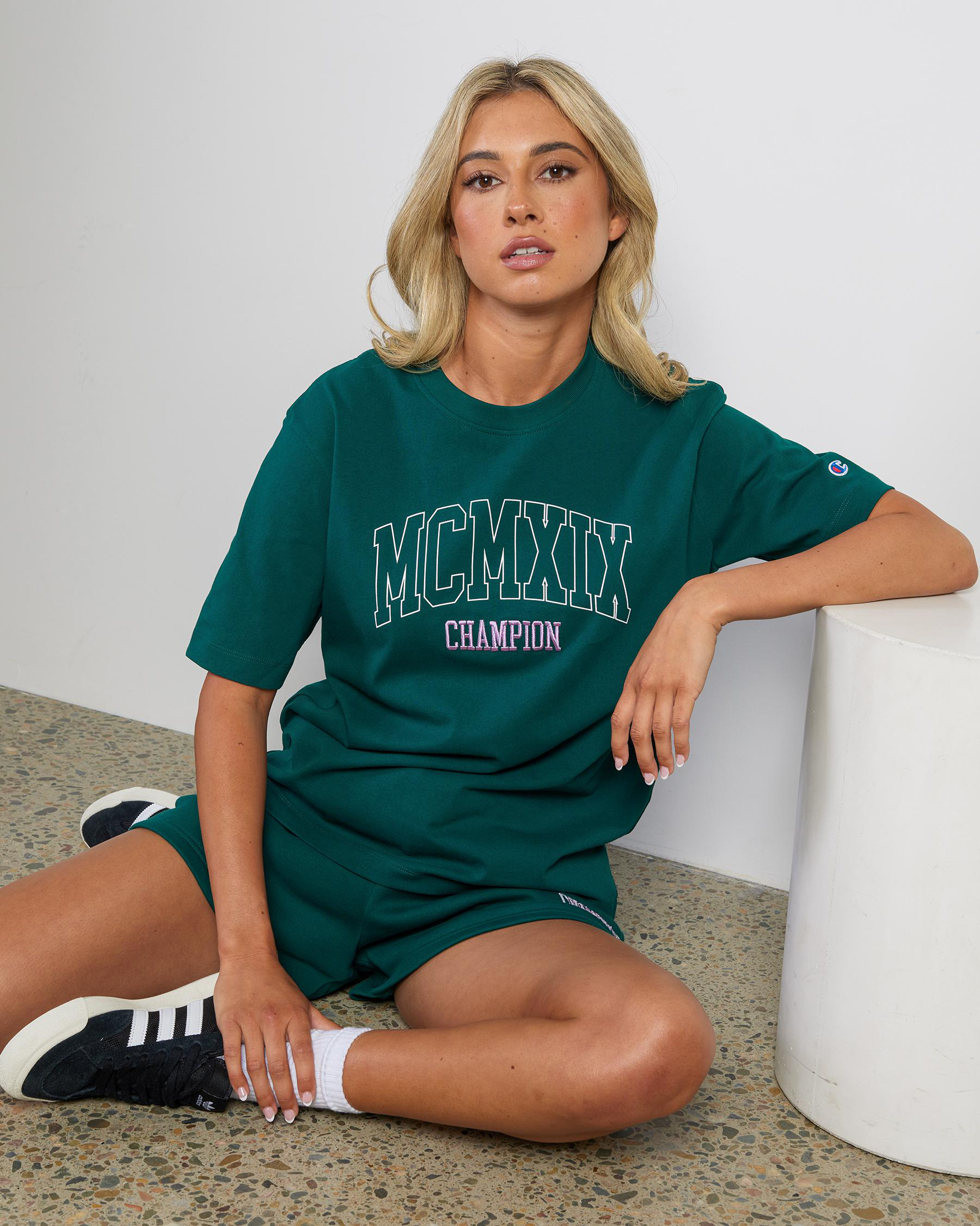 Shop Champion Rochester MCMXIX T-Shirt In Night Garden - Fast Shipping ...