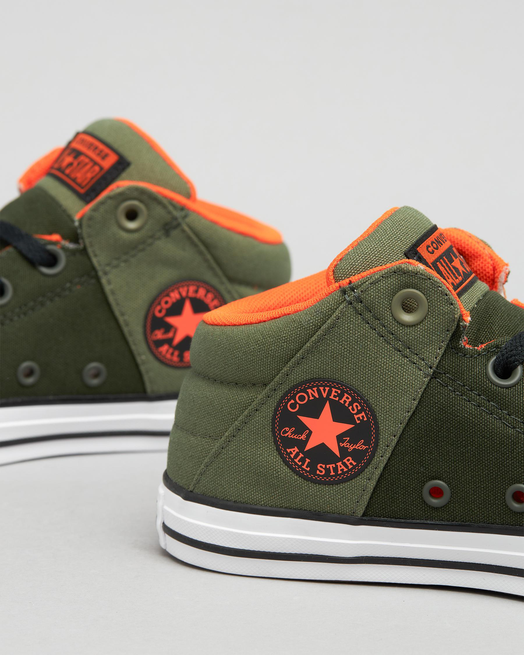 Shop Converse Junior Boys' CTAS Axel Mid Shoes In Utility Green/utility ...
