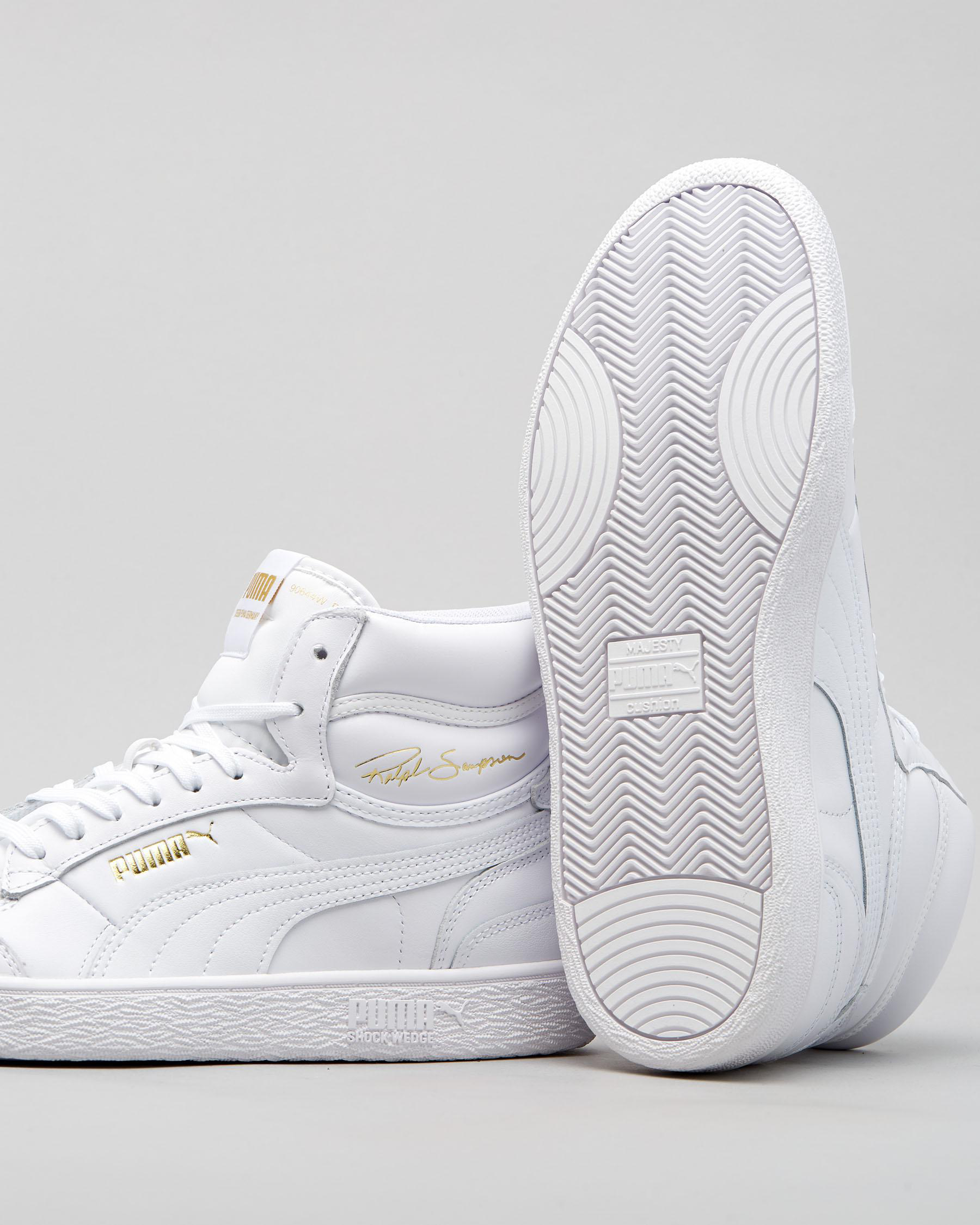 Shop Puma Ralph Sampson Mid Cut Shoes In White/team Gold - Fast ...