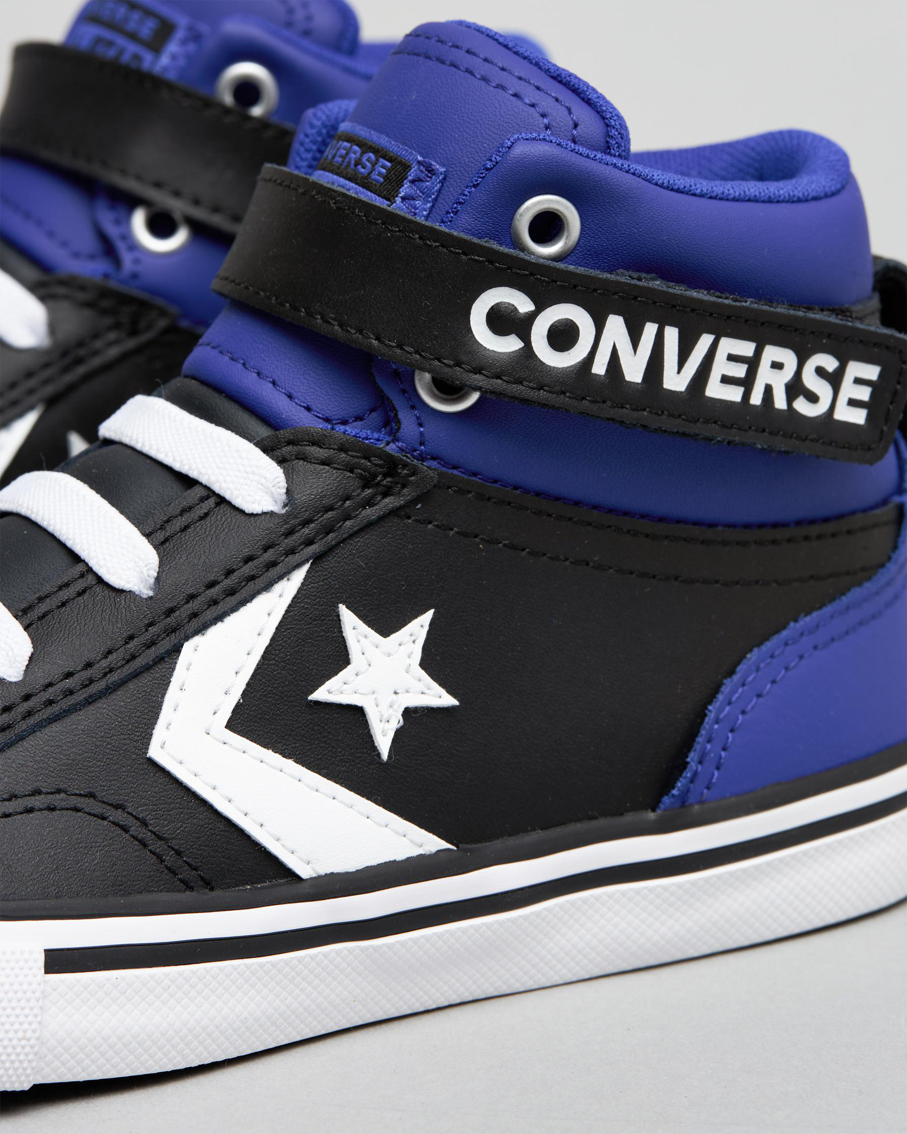 Shop Converse Junior Boys' Pro Blaze Strap Hi-Top Shoes In Black/blue ...
